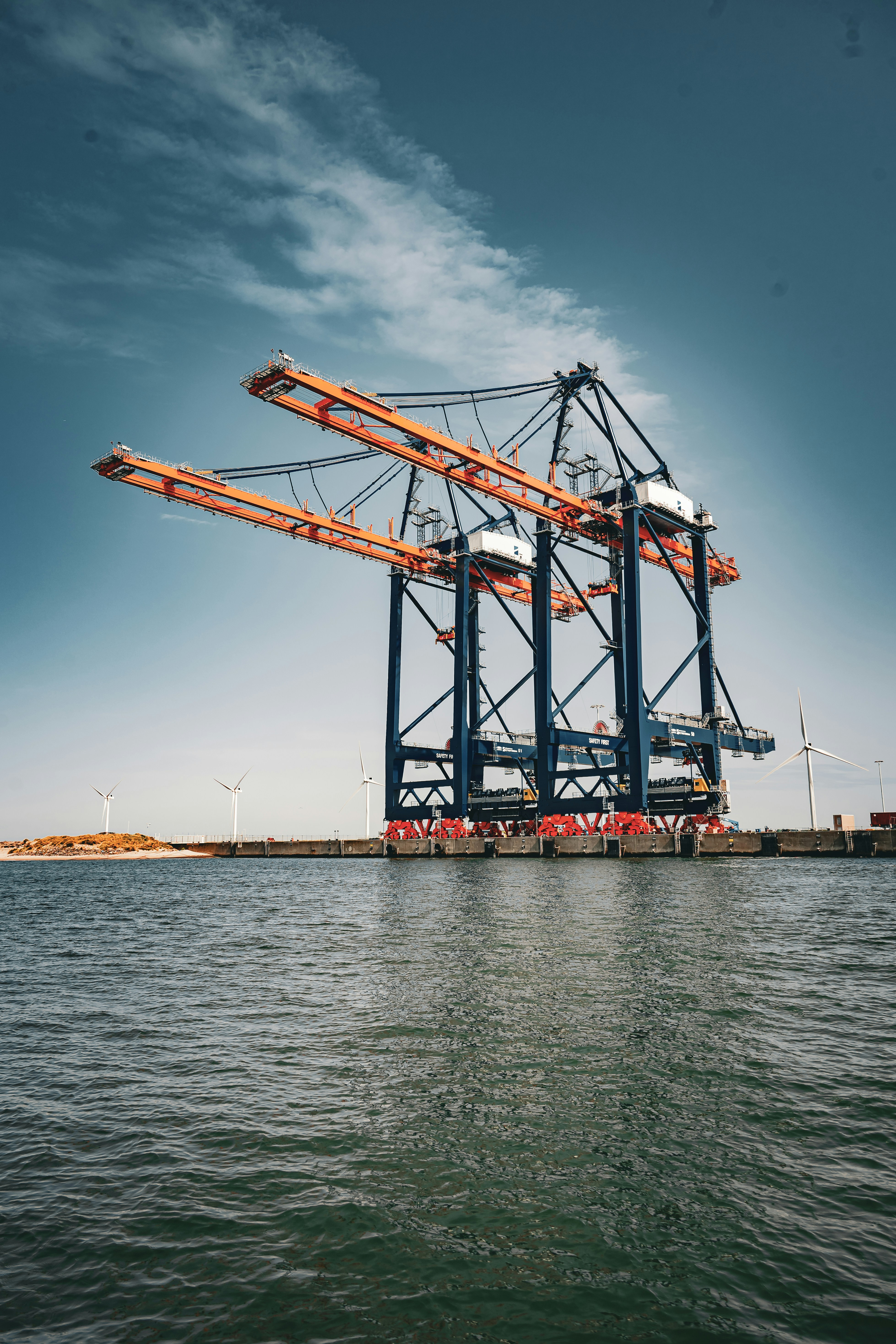 Harbor Crane at Dusk: A Monument of Steel and Sea