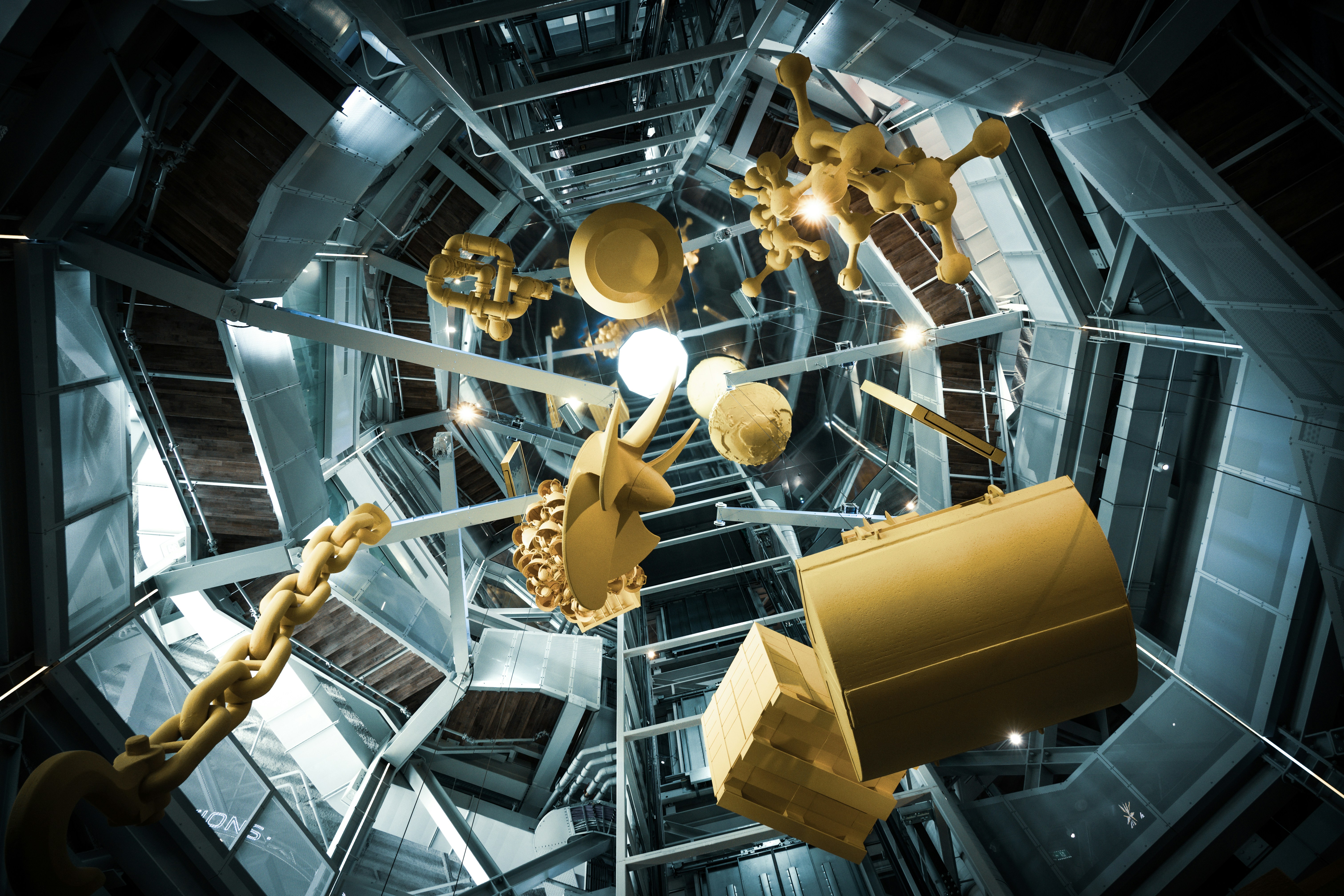 Suspended Mechanisms: A Chaotic Orbit of Golden Ornaments