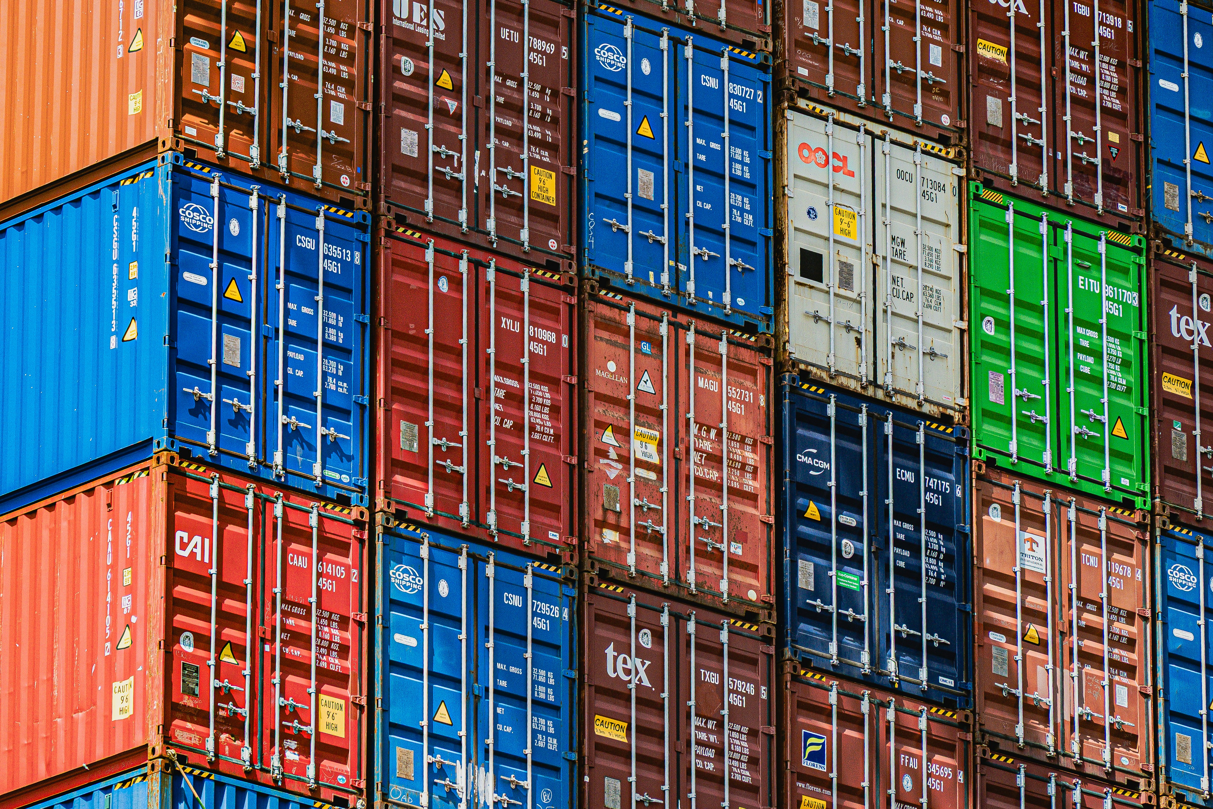 A Tapestry of Freight: Multicolored Containers in a Dense Wall