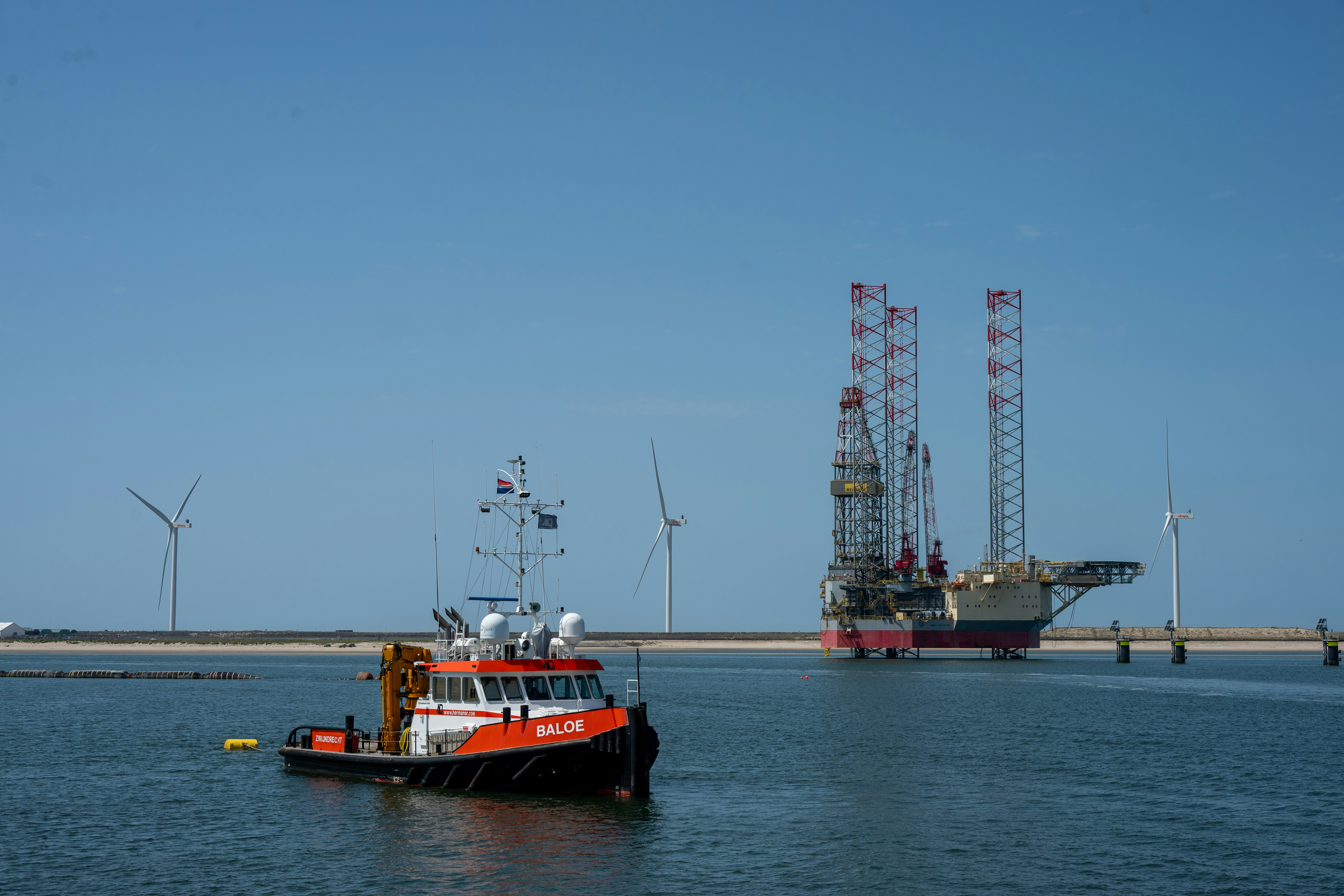Towboat at the Dock: Offshore Platform in Calm Atlantic Water