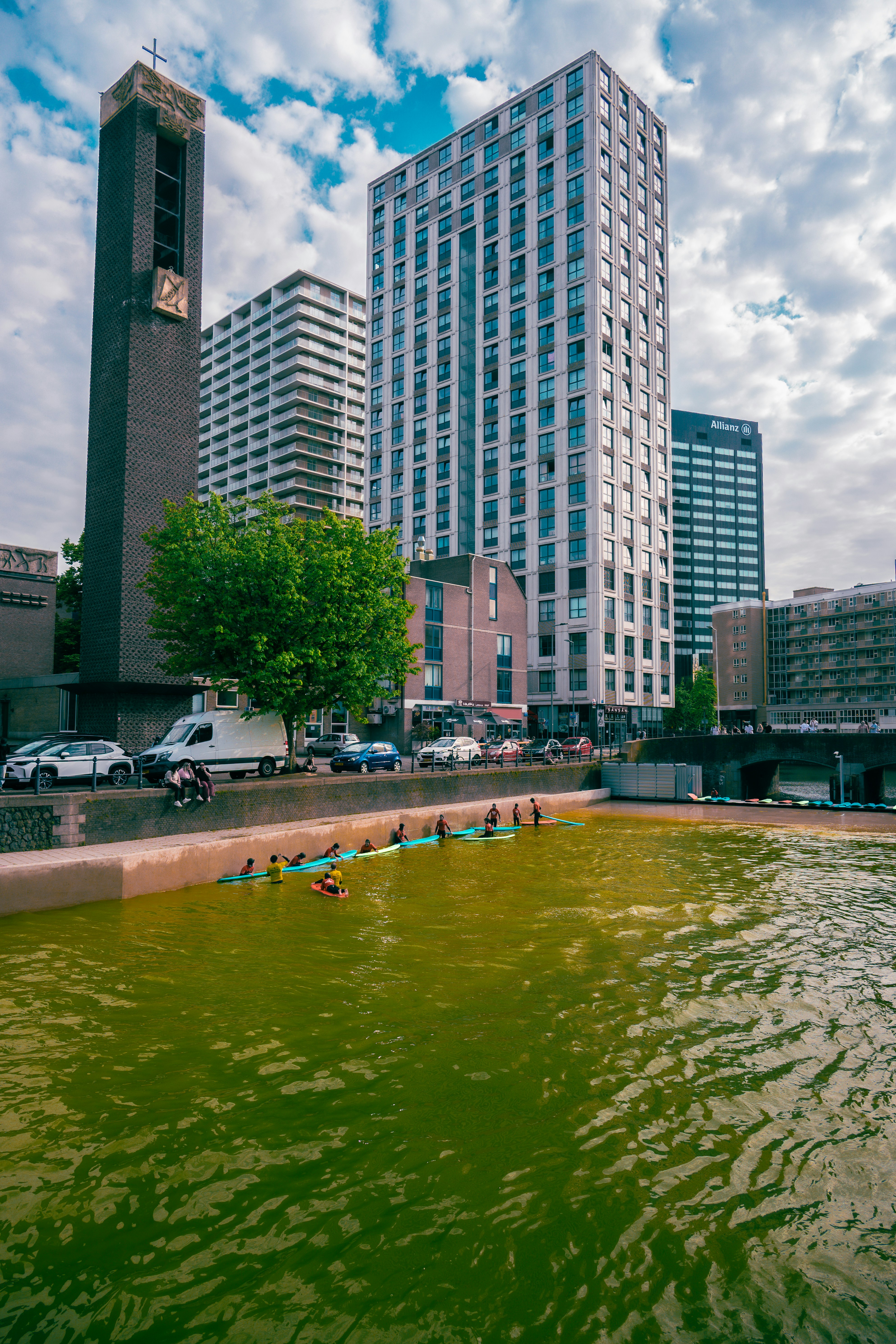 Urban Canal: Skimming Riverside Life Beneath Skyscrapers