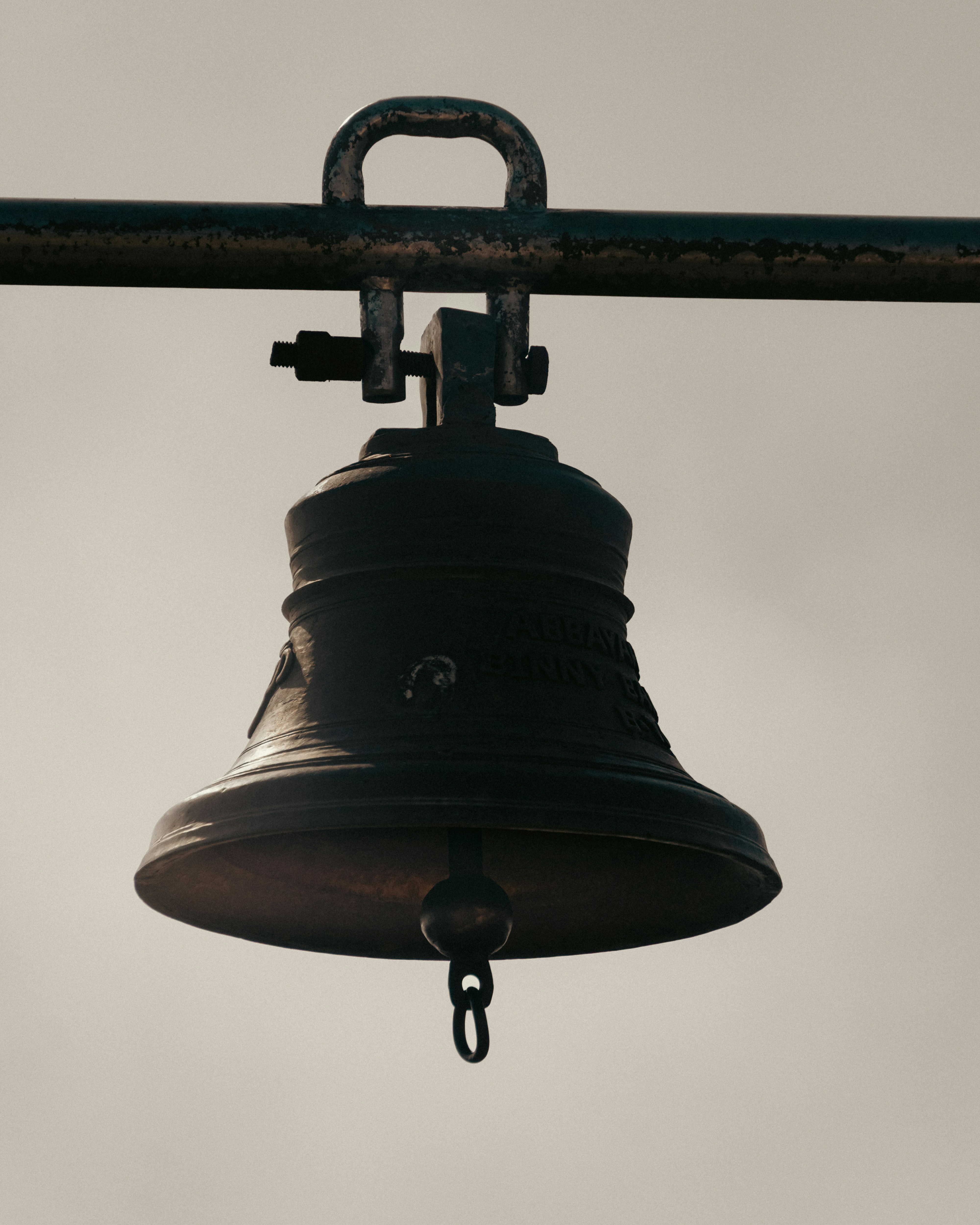 Low-Angle Bell Under a Painted Sky