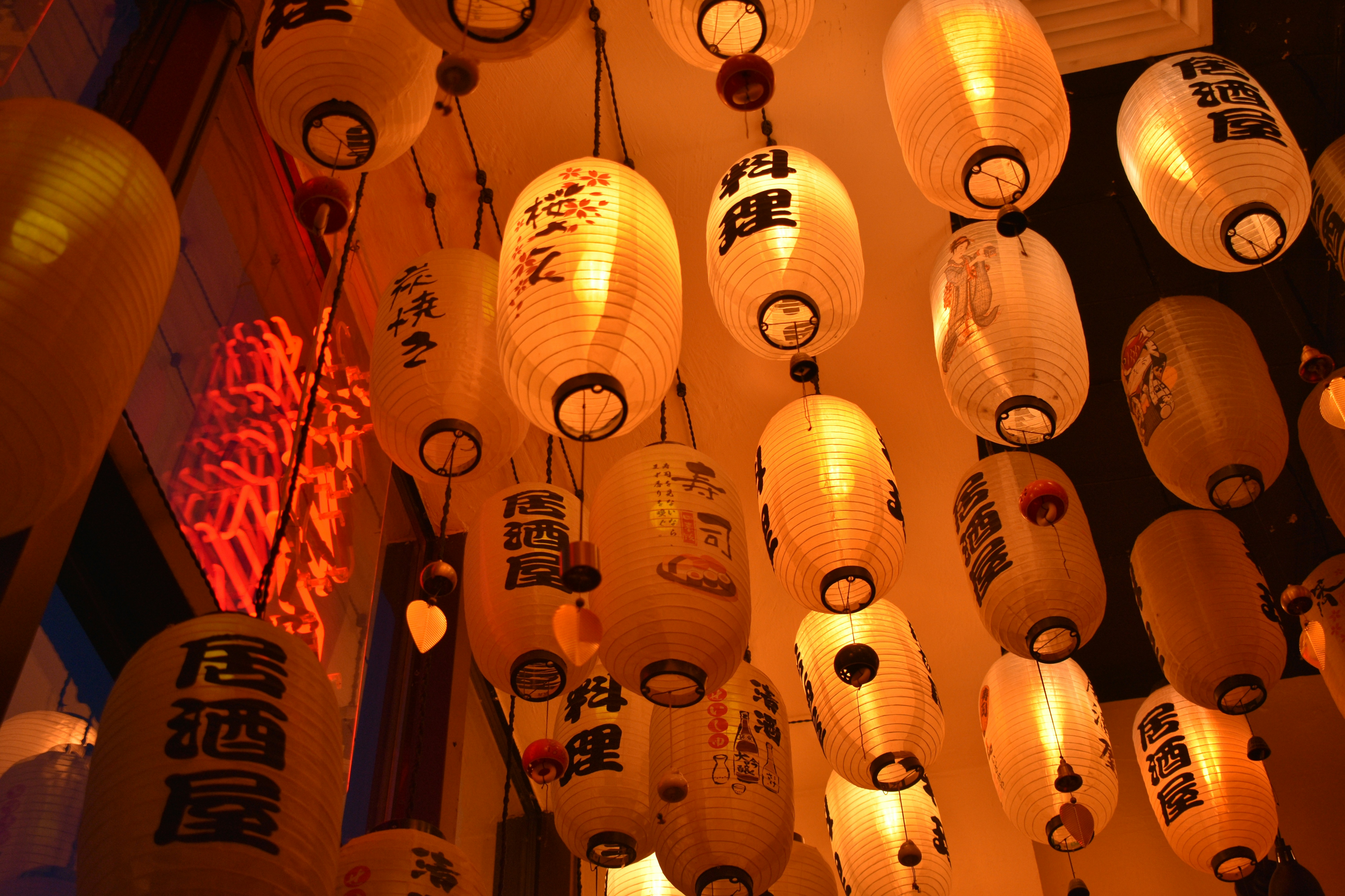 Lantern Corridor: Warm Glimmer Amid Hanging Orbs