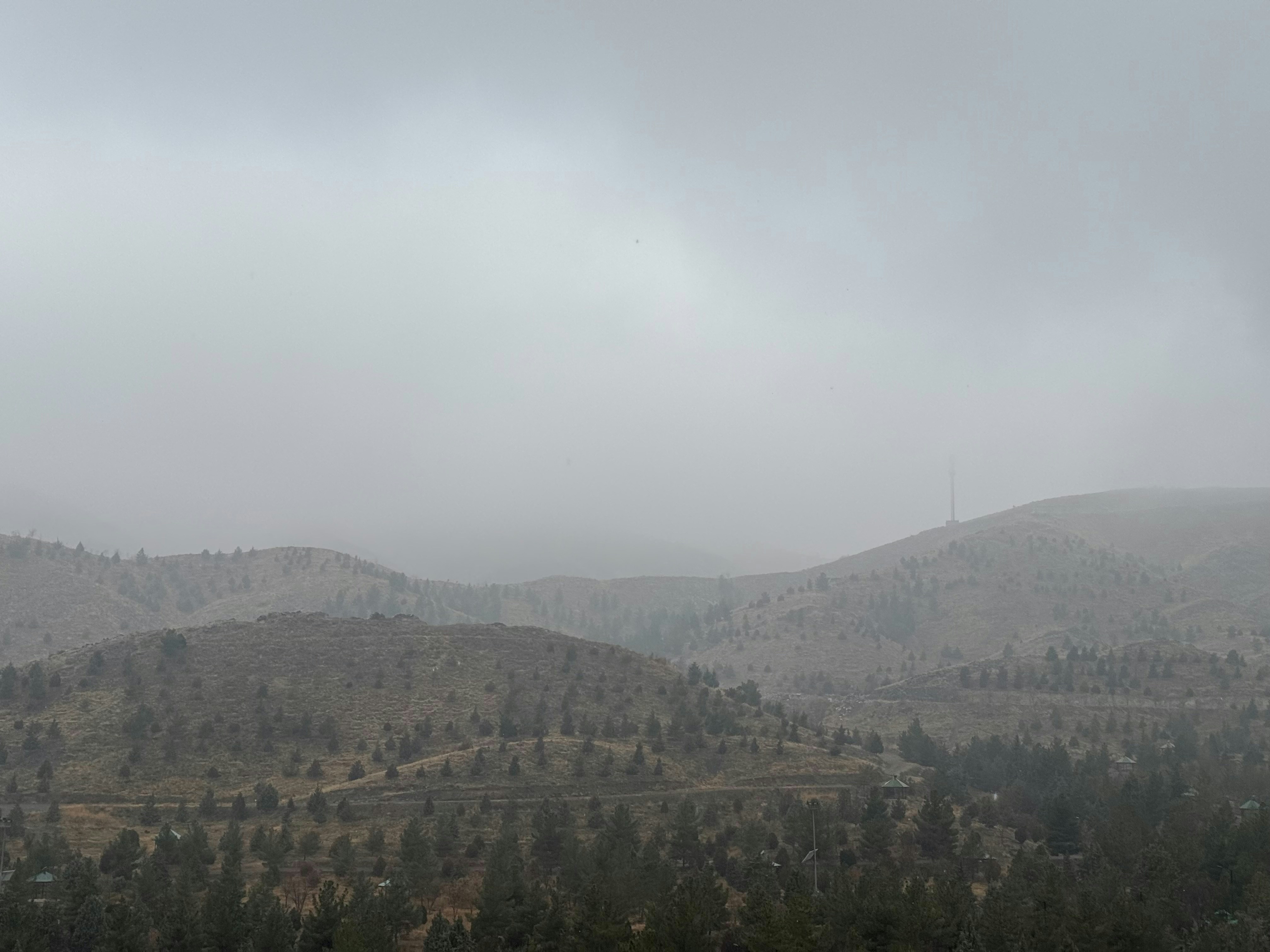 Misty Hills Under a Quiet Sky