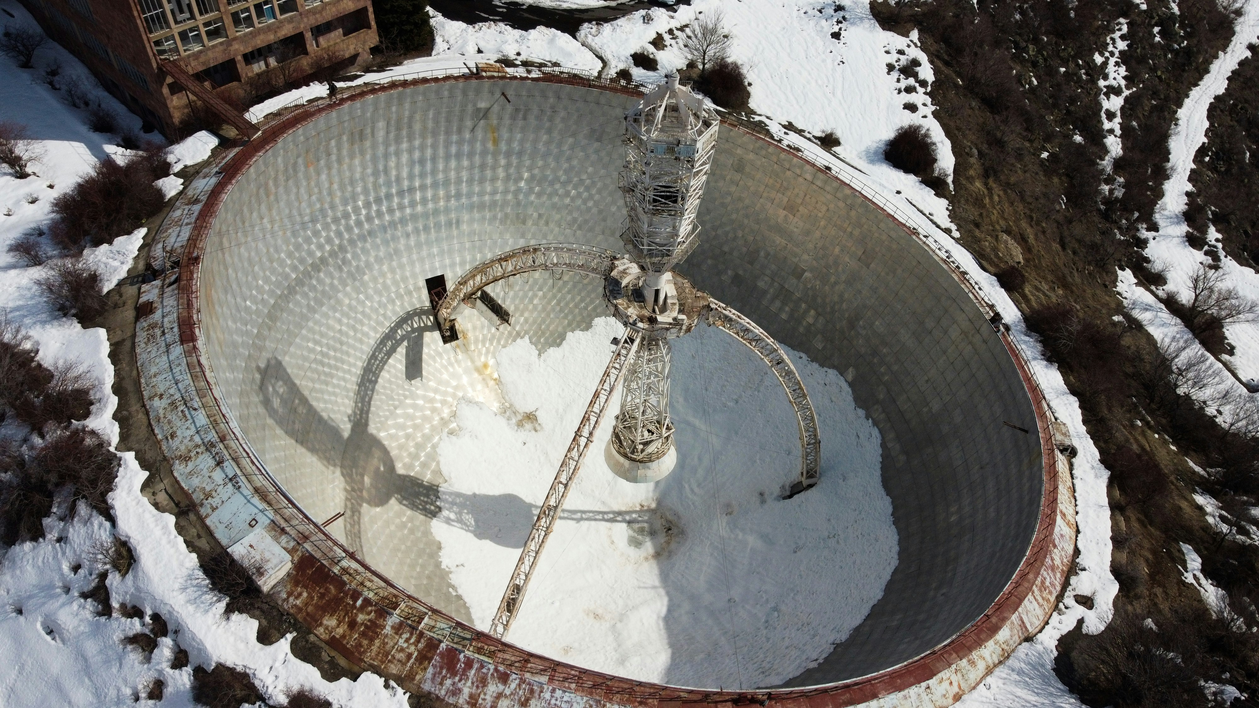 Abandoned Cold Ring: Aerial View into a Snow-Cooled Cavity