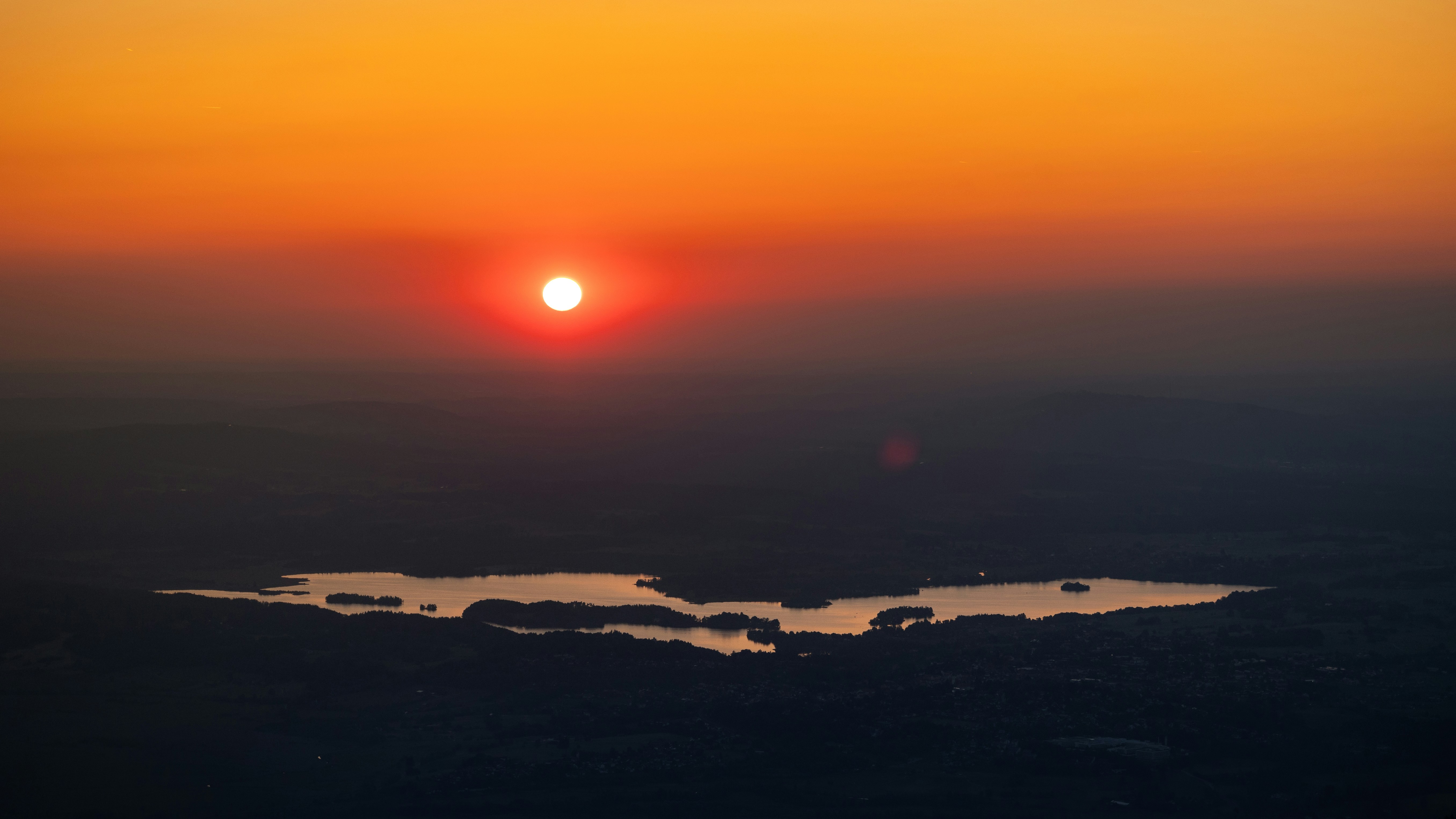 Sunset Over Meandering Rivers: Dusk Delicacy from Above