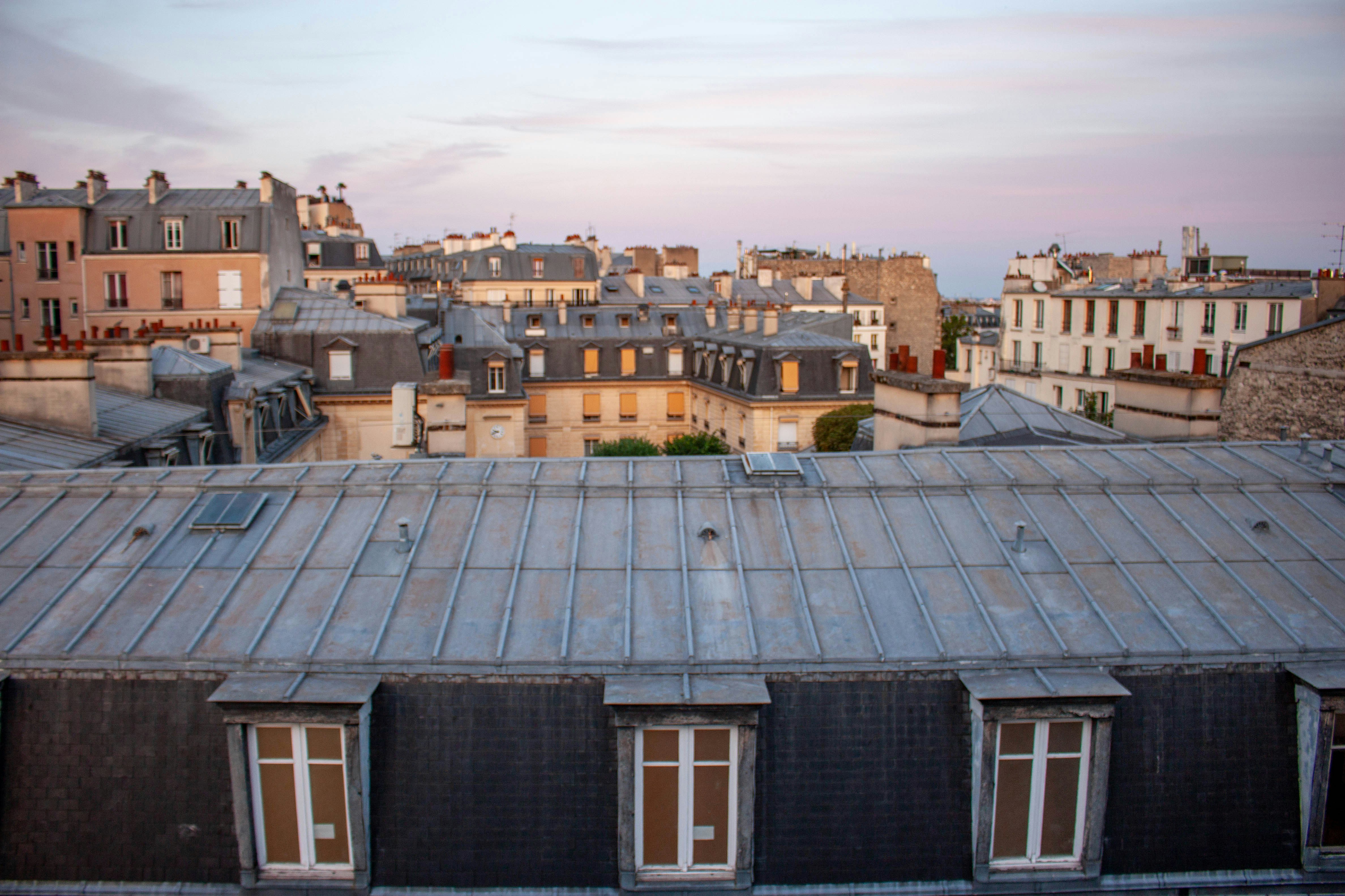 Parisian Rooftops at Dusk: Slate and Skylight Rhythm