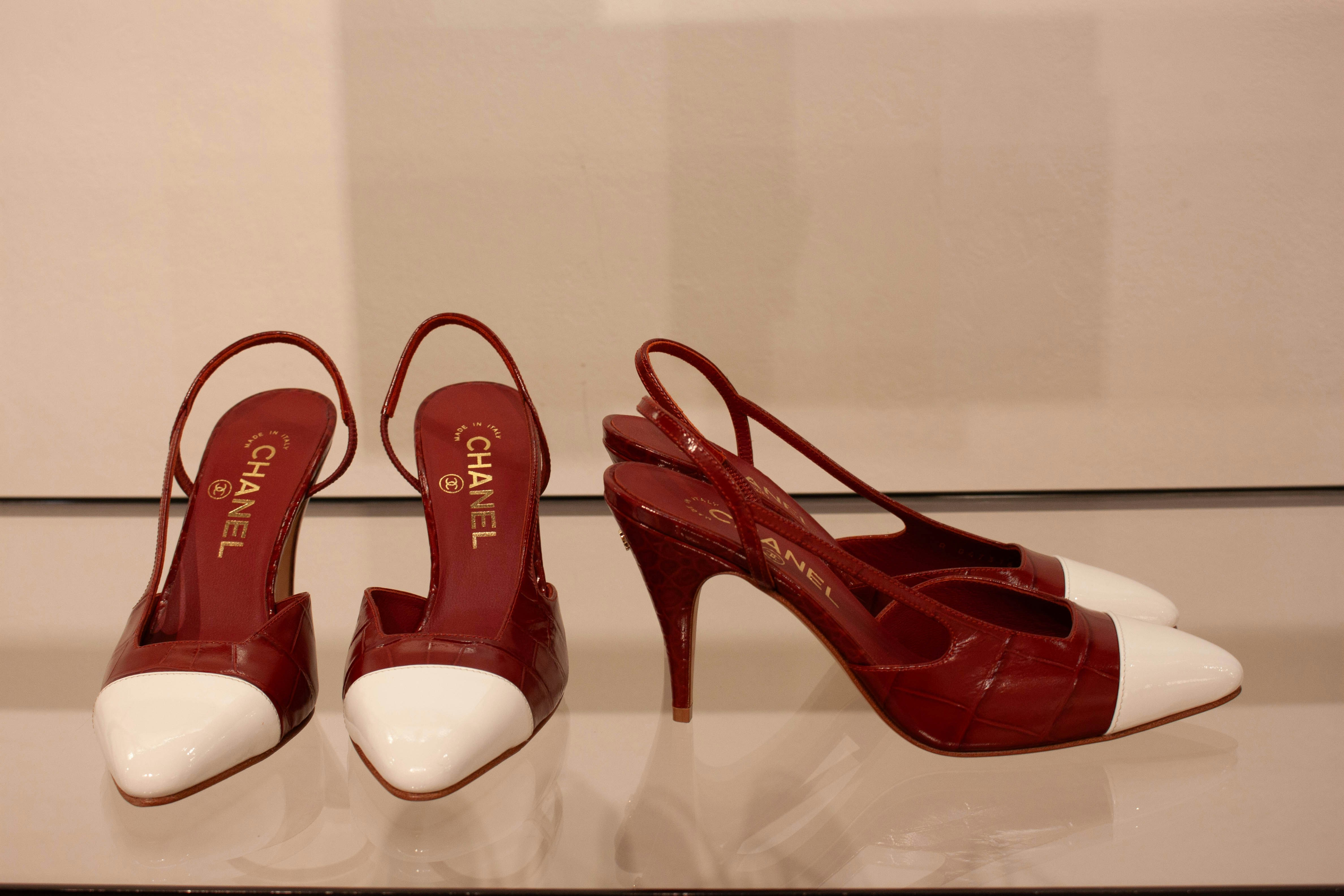 Chic Red Patent Heels with White-Tipped Toes on Display
