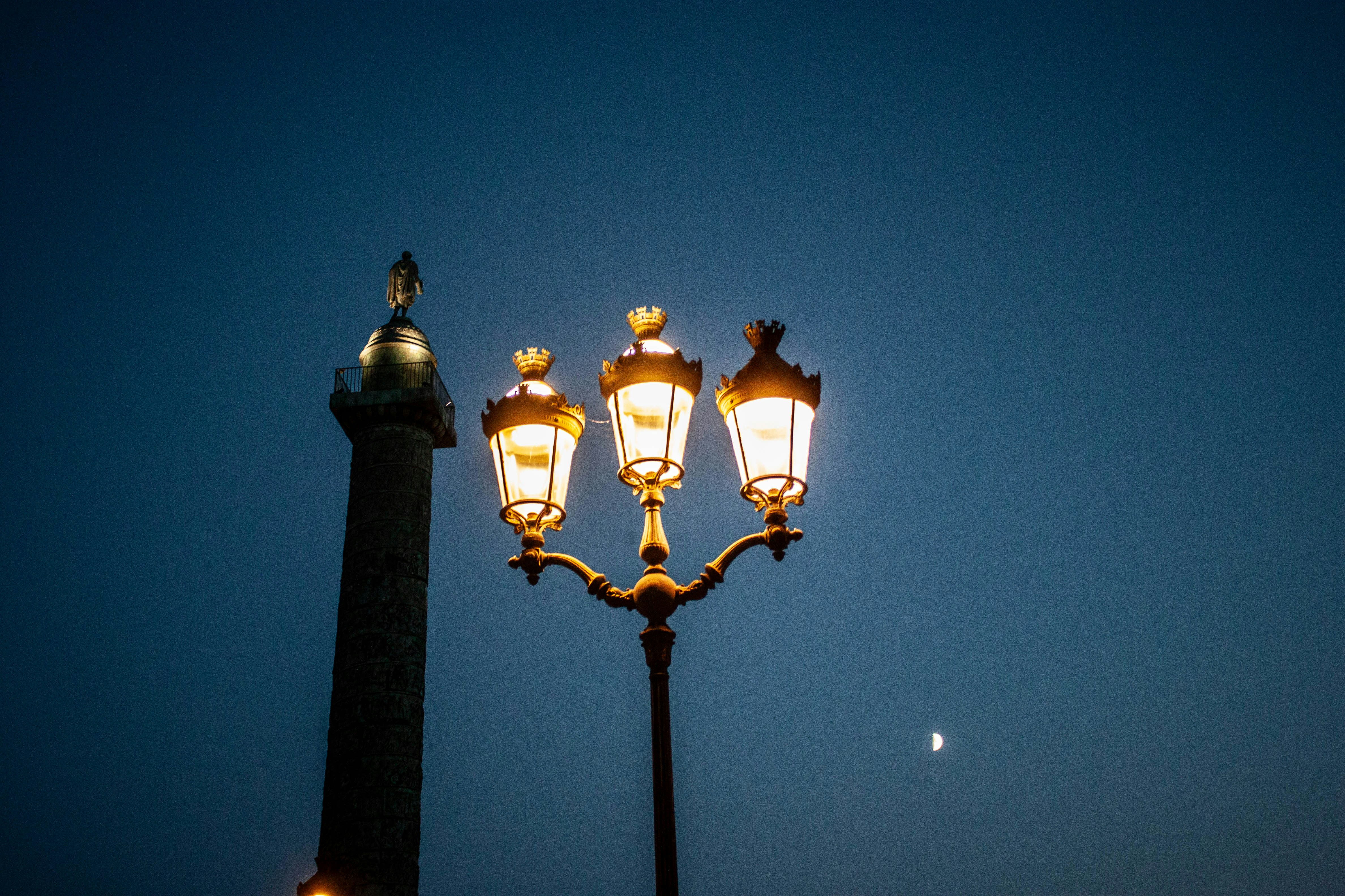 Lamps of the Night: A Quiet Sentinel by the Moon