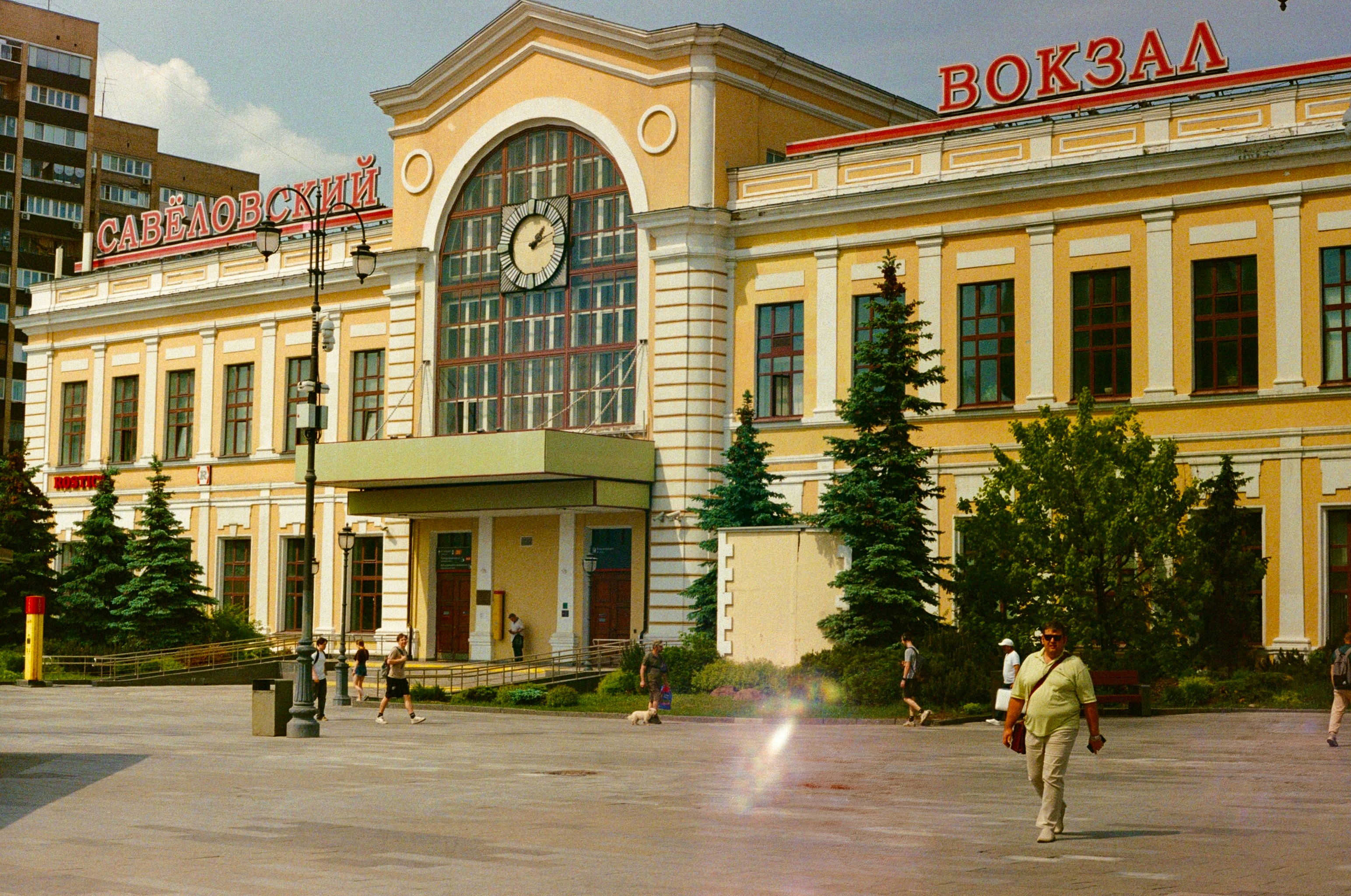 Sunlit Railway Station Facade in Soft Color