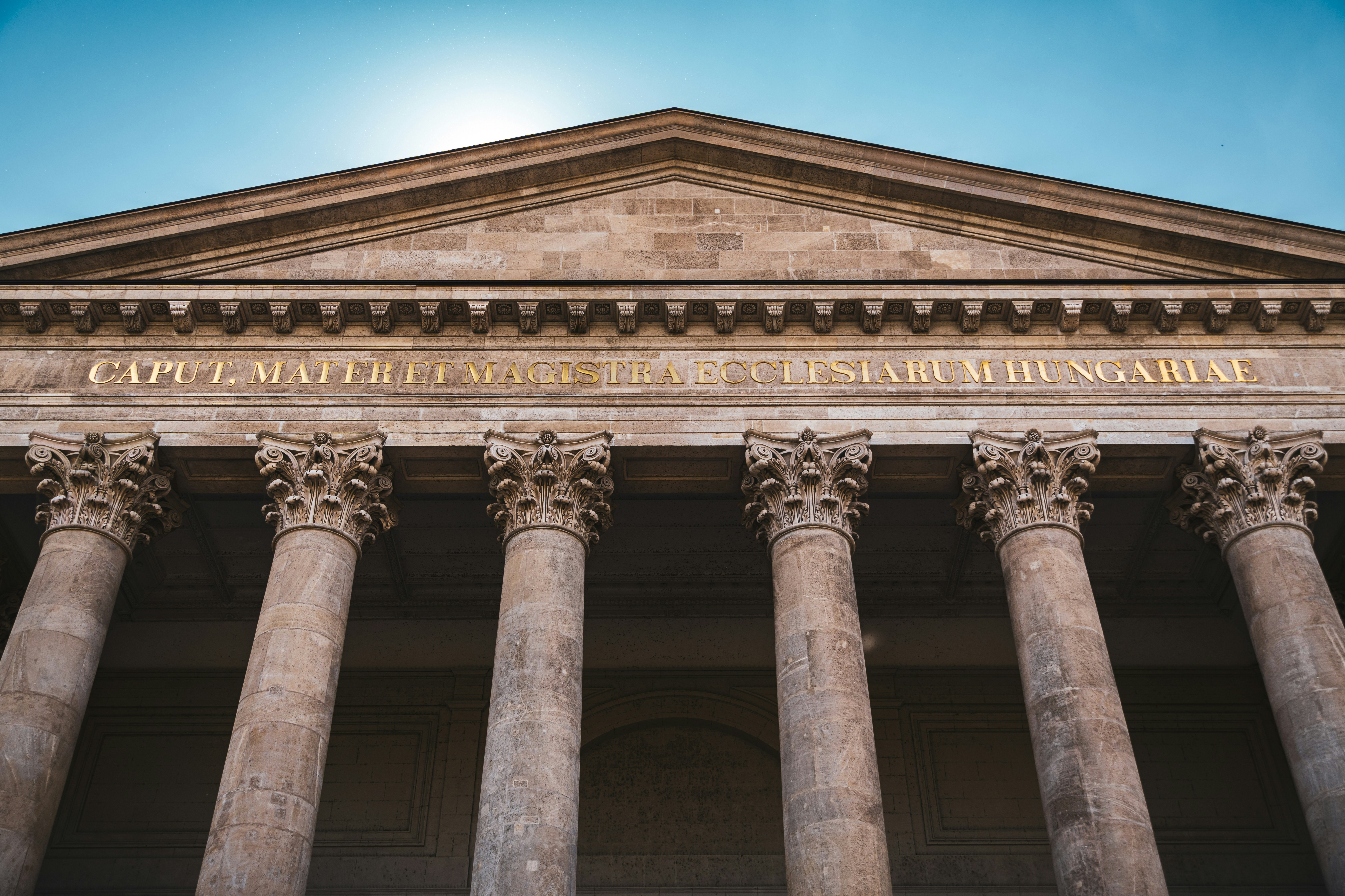 Classical Facade: Stone Columns and Inscribed Pediment