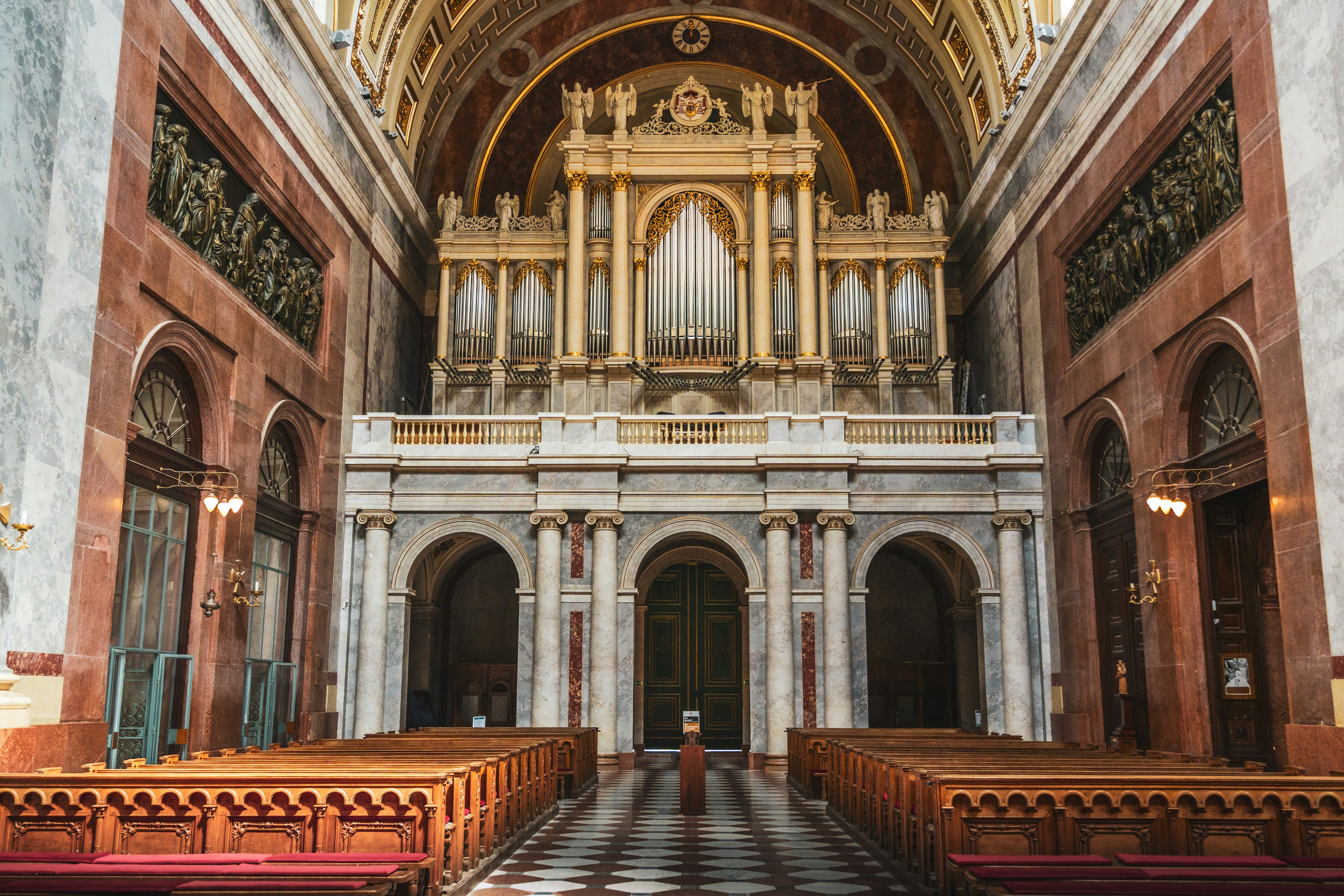 Architectural Reverie: A Grand Organ Silhouette in a Marble Cathedral