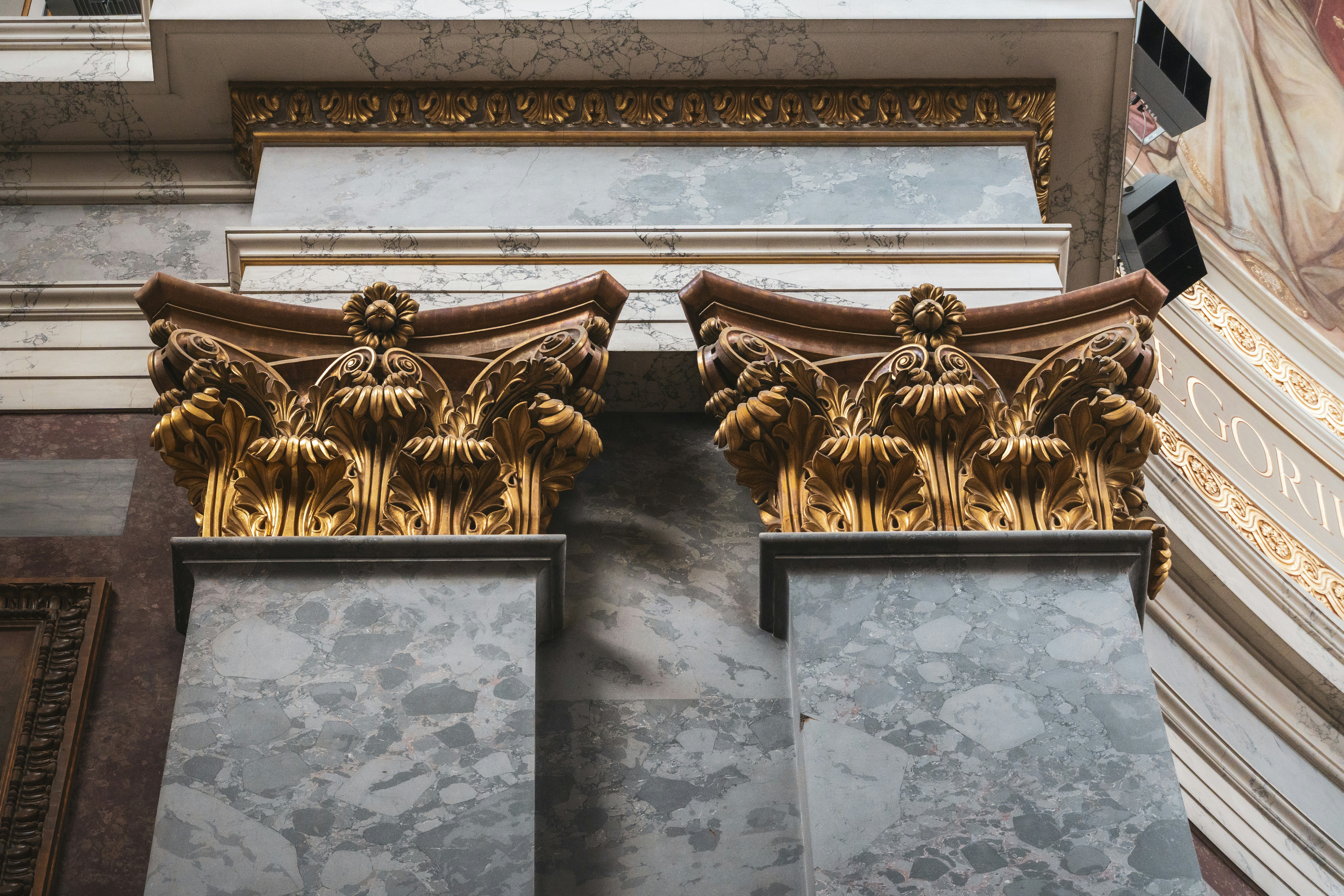Ornate Architectural Corbels Crown Marble Columns