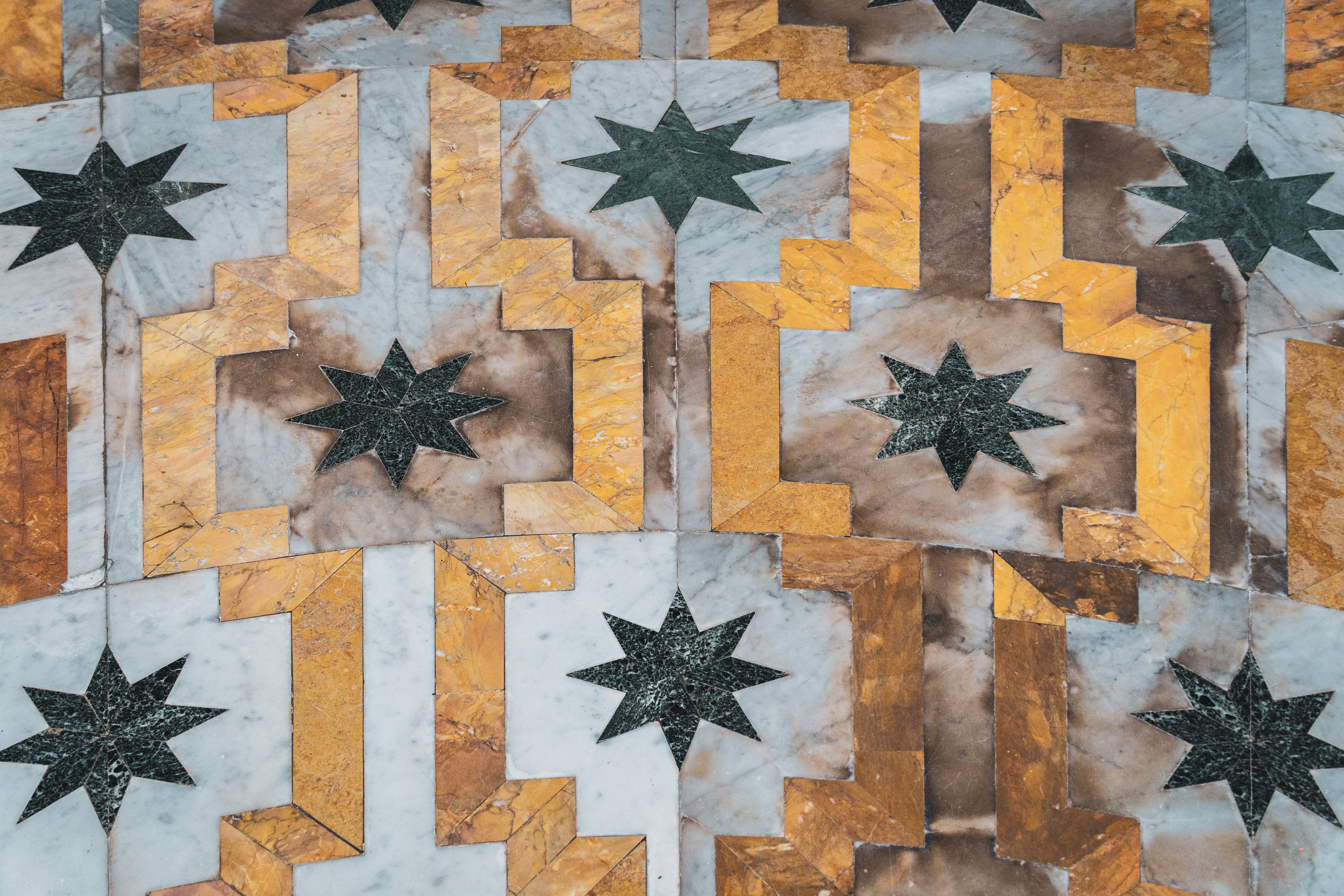Geometric Tiles: Starbursts in Porous Mosaic