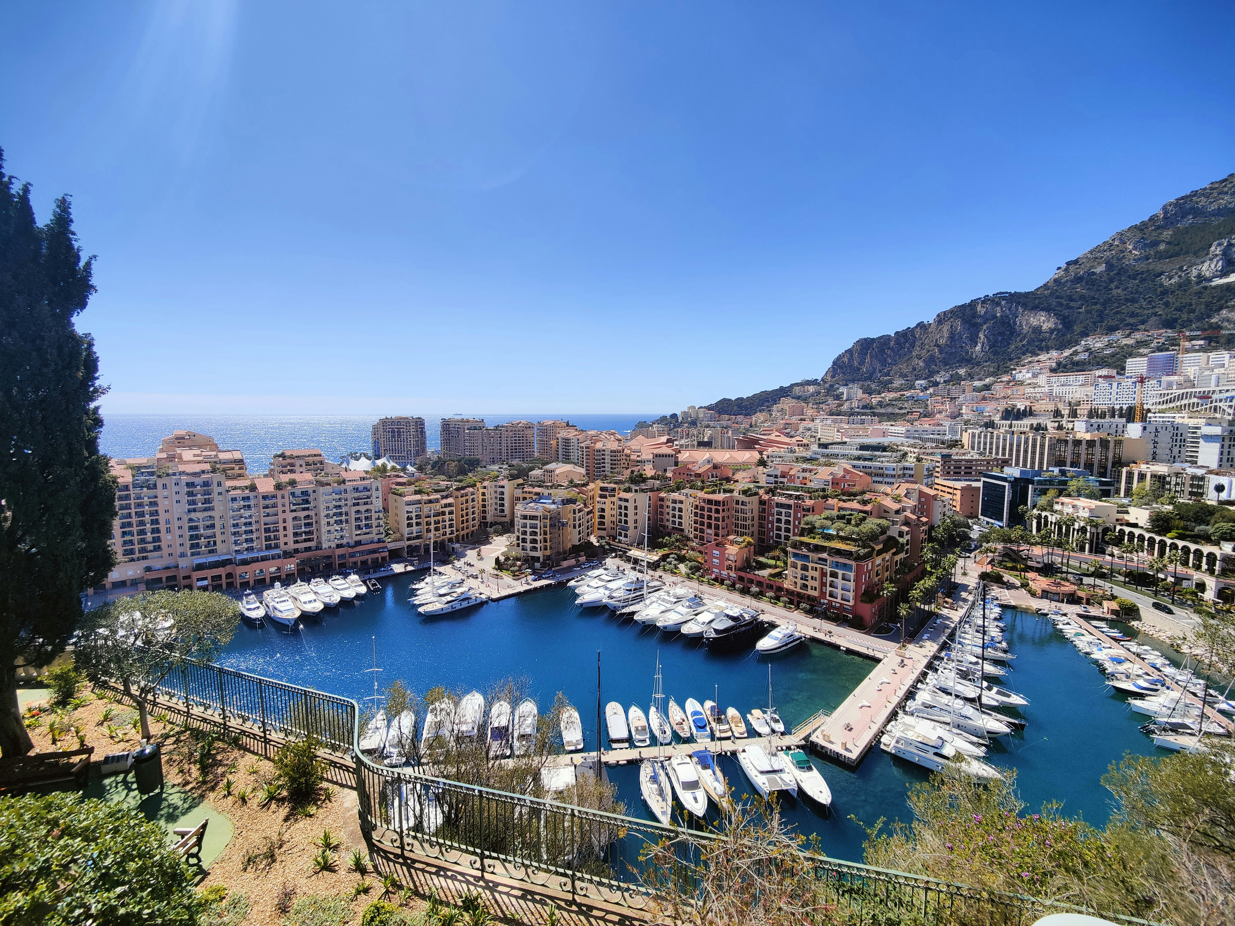 Marina at the Foot of a Sunny Cliff