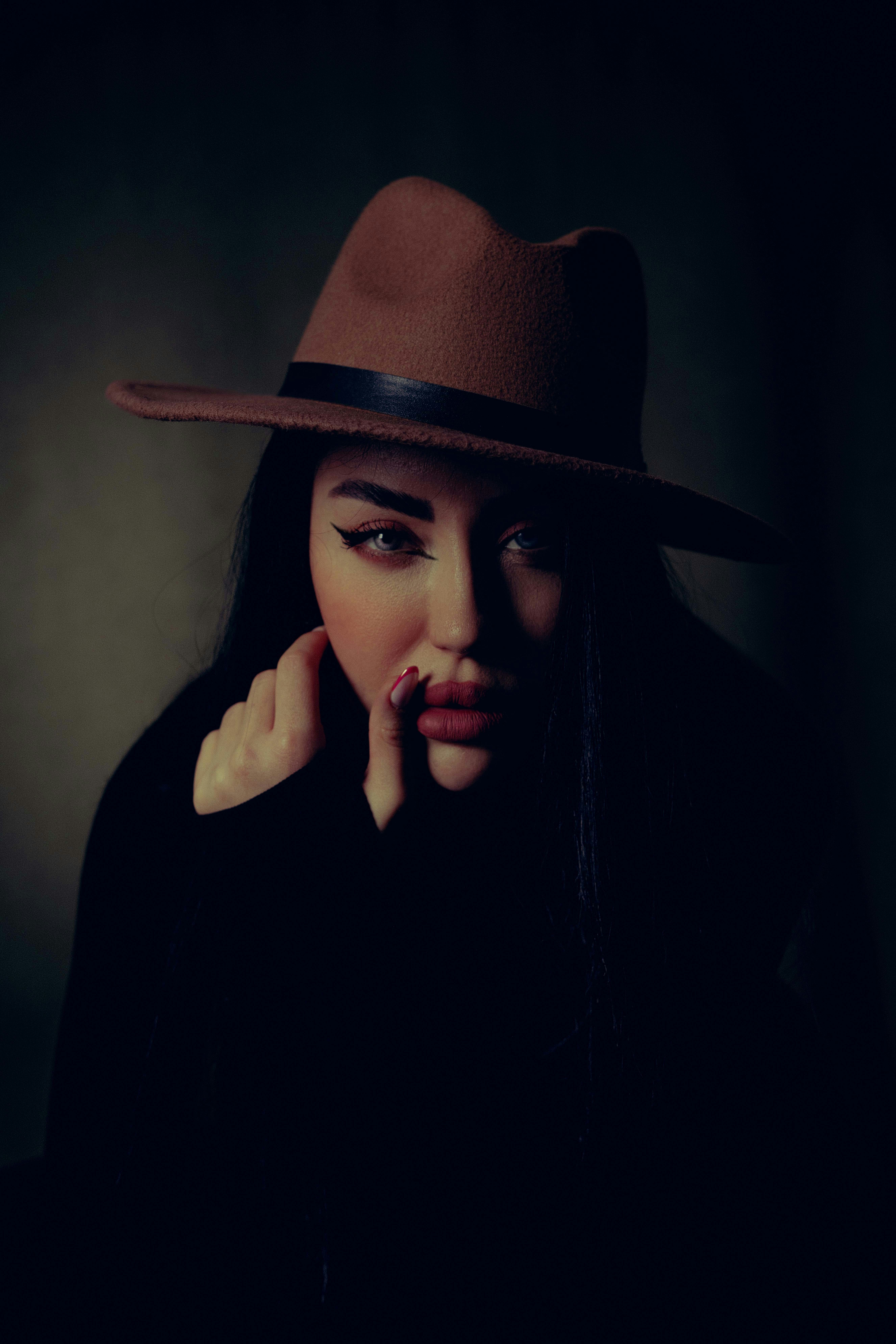 Shadowed Gaze in a Velvet Hat