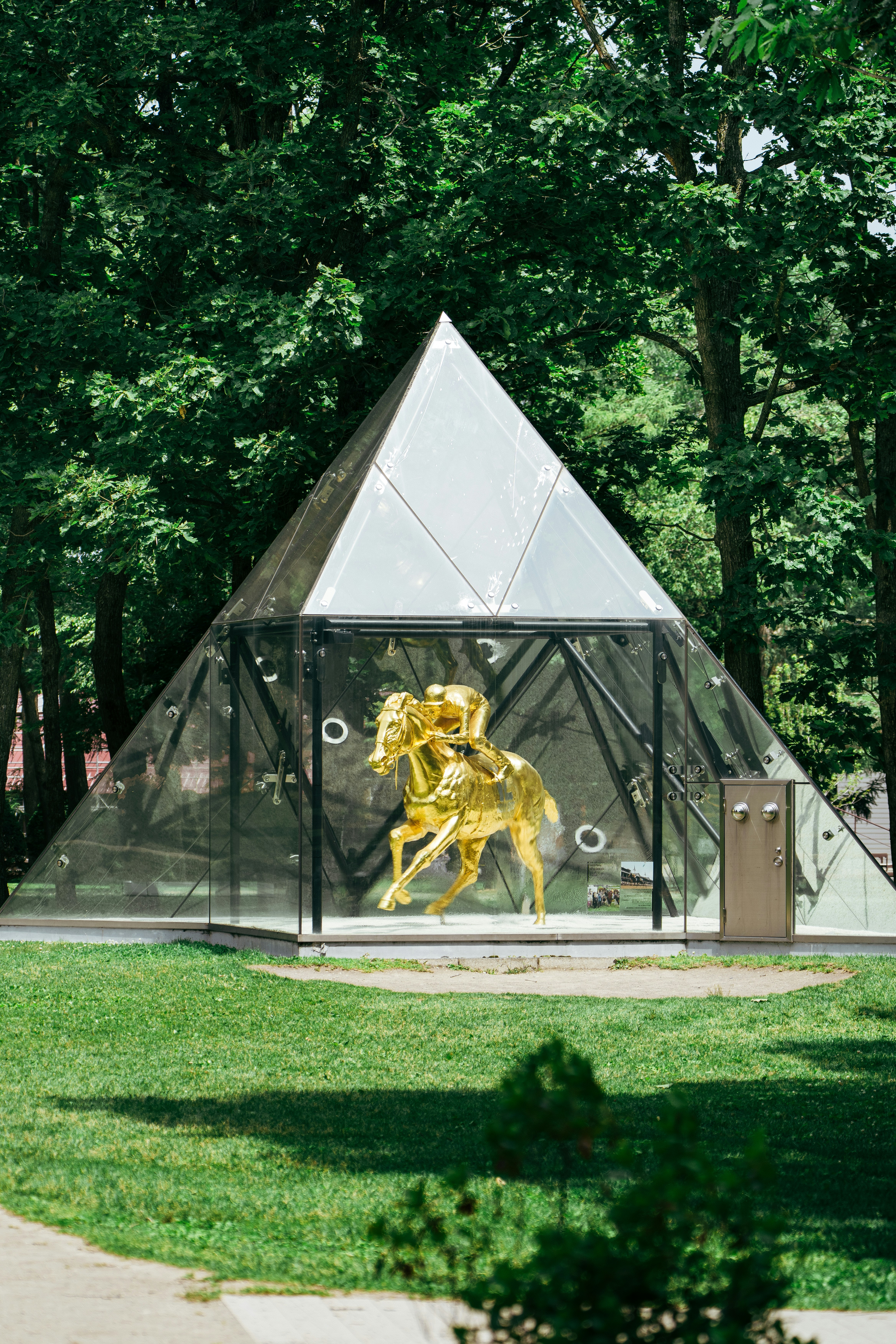 Gilded Stallion in a Glass Pyramid