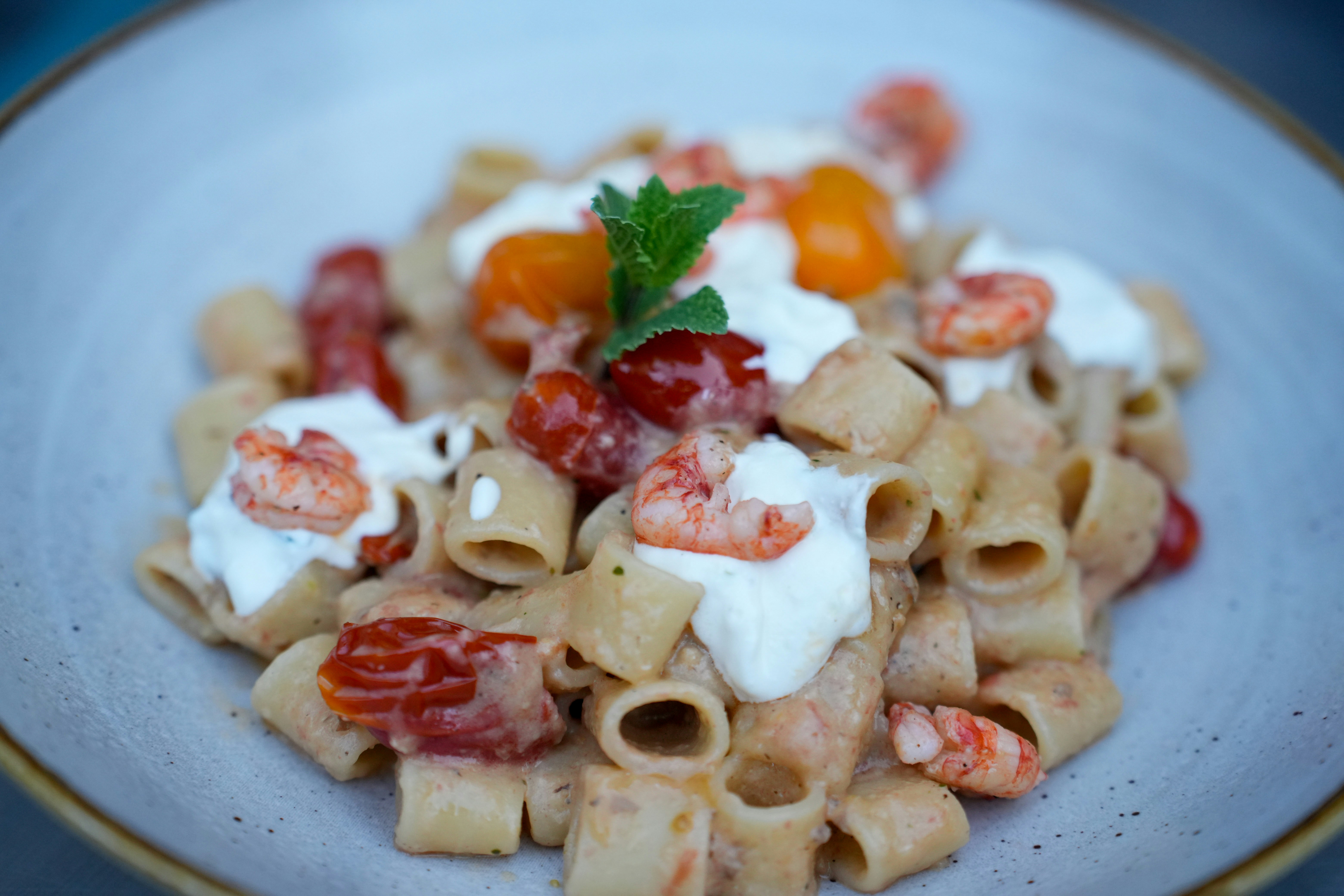 Creamy Lobster-Red Pepper Pasta with Fresh Mint Garnish