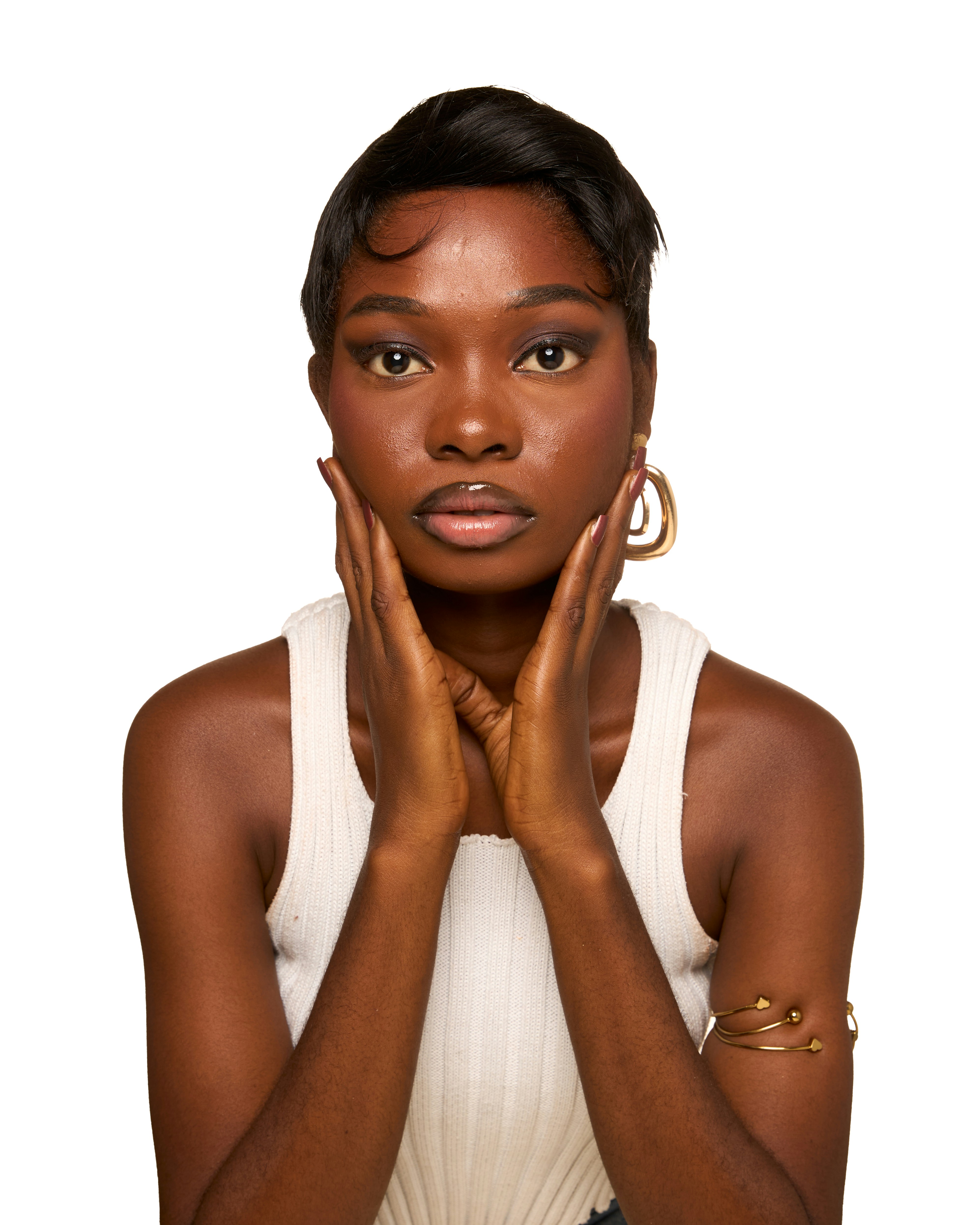 Boldly Poised Portrait: A Warm Gaze with Silky Undertones