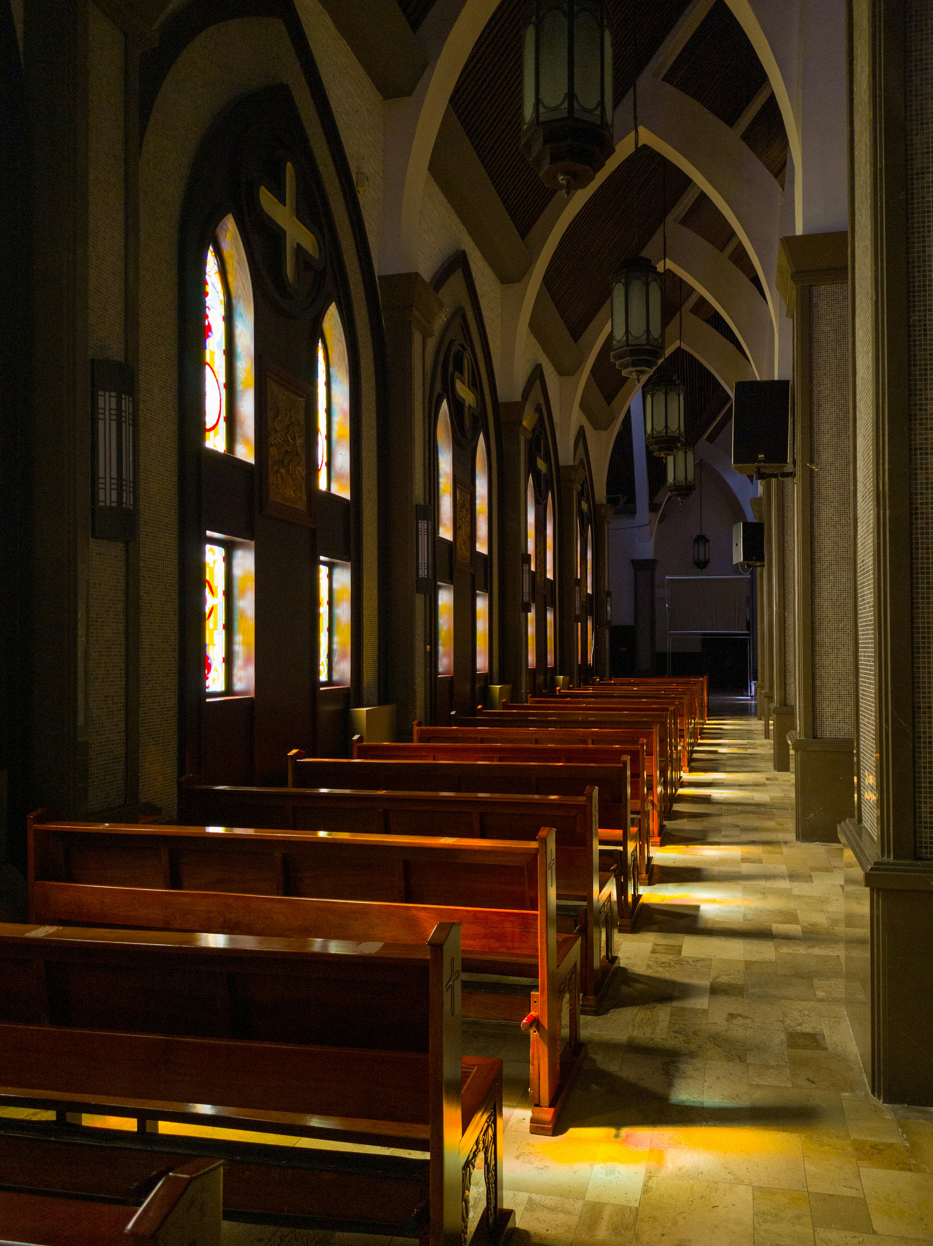 Sunlit Aisle: Quiet Reverence in a Gothic Church