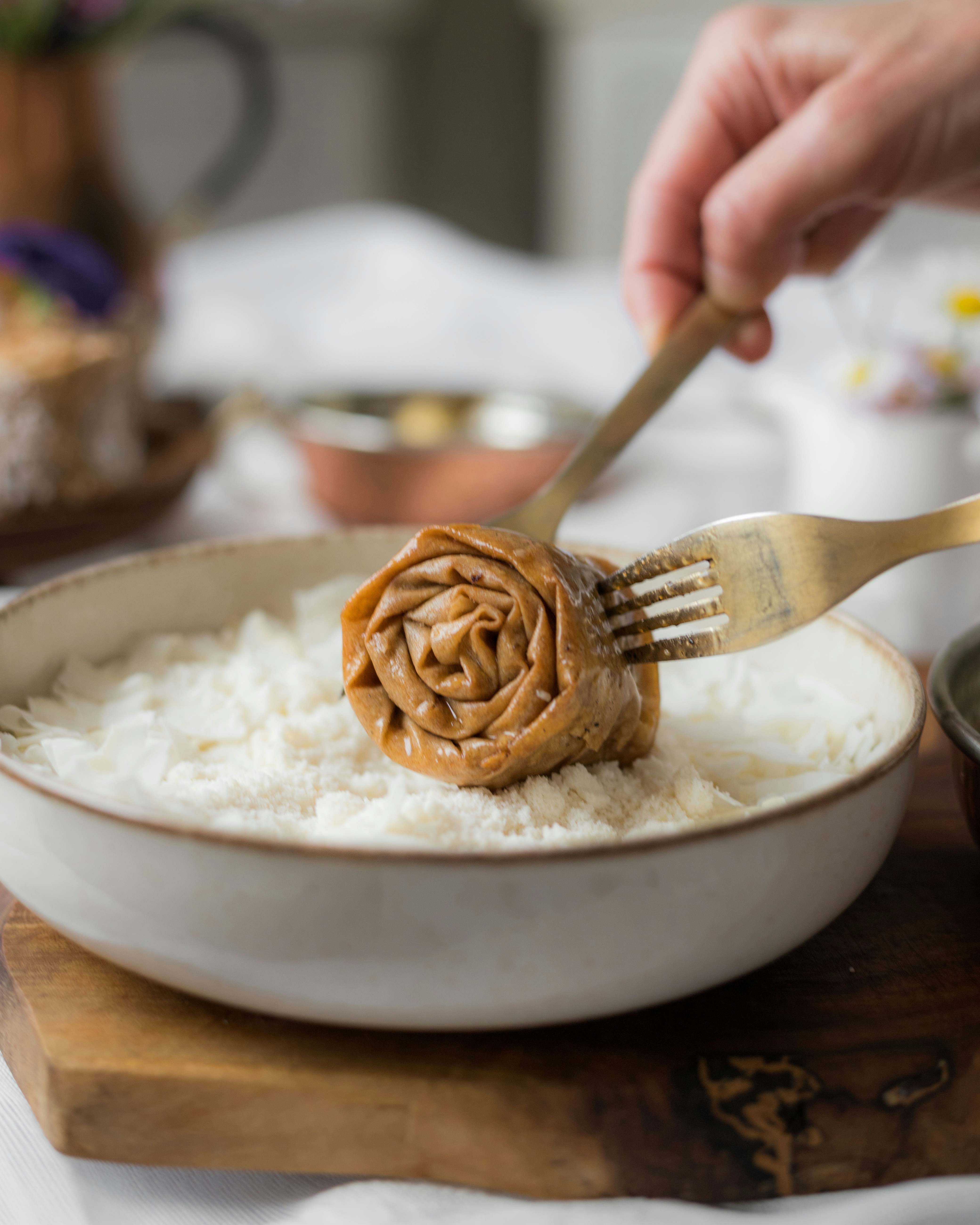 Caramel Rose on a Bed of Powdered Sugar
