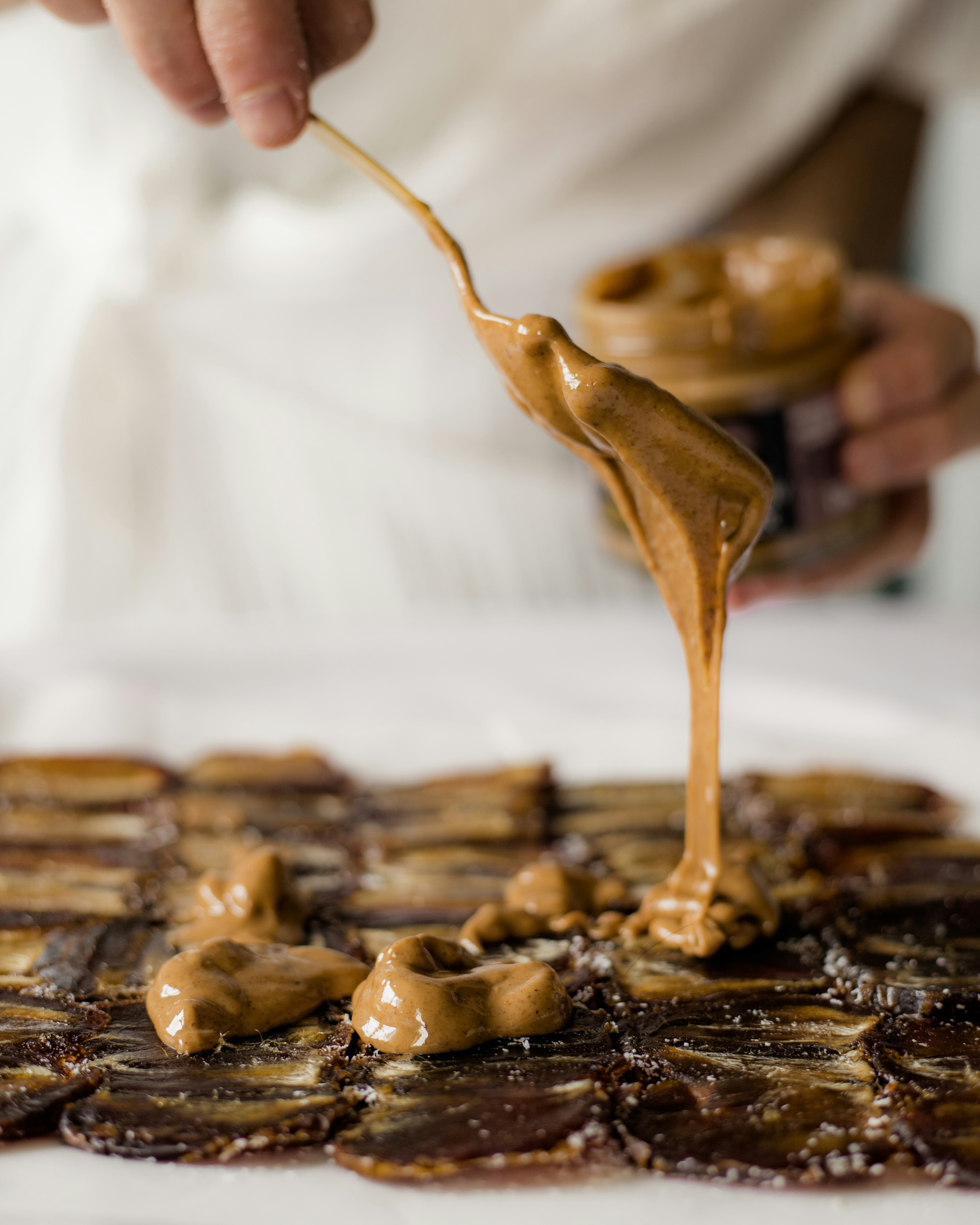 Silky Caramel Cascade over Chocolate Mosaic
