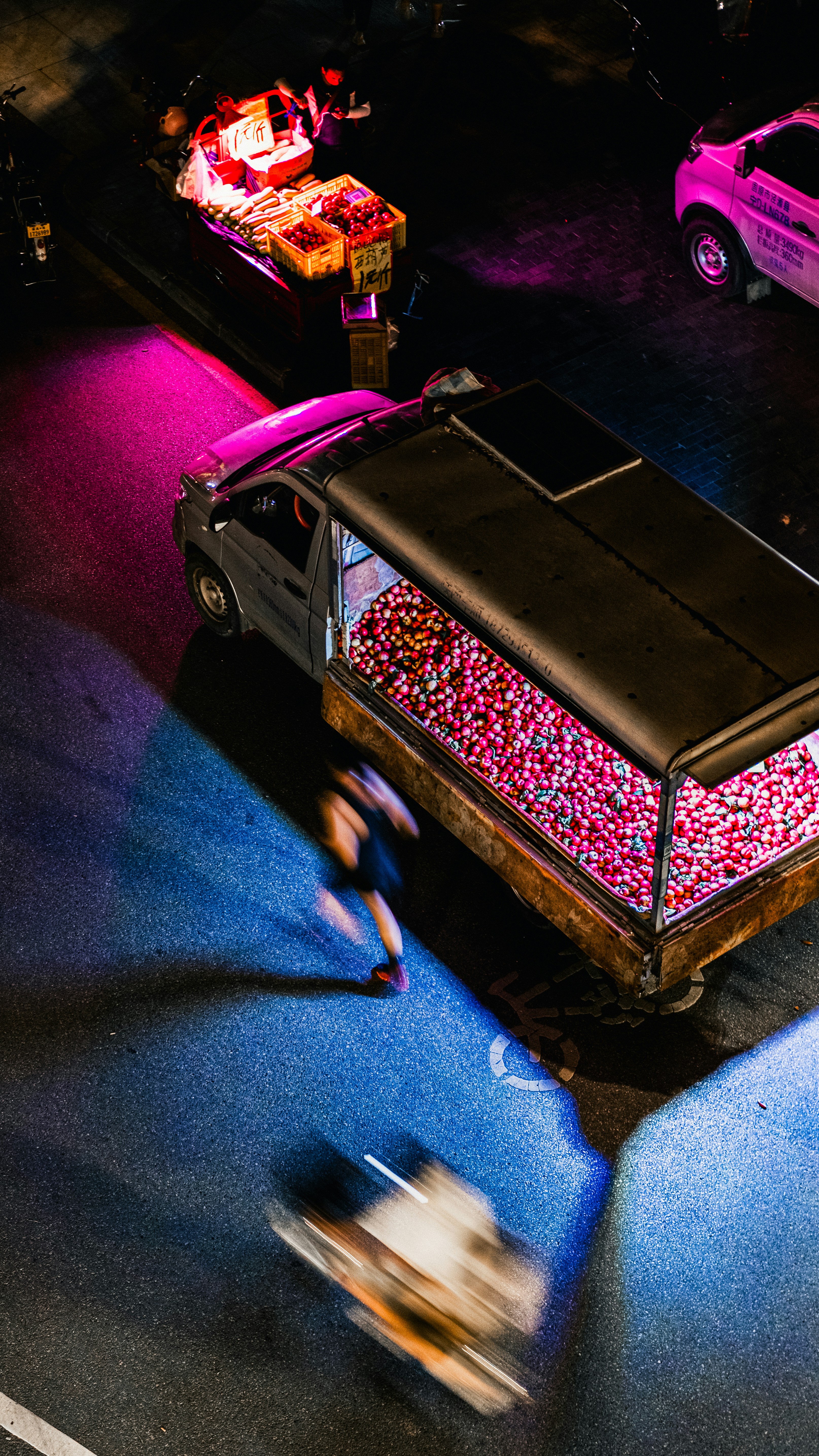 Overhead Street Market: Neon Light, Moving Trunk, and Fruit Bed Jewelry