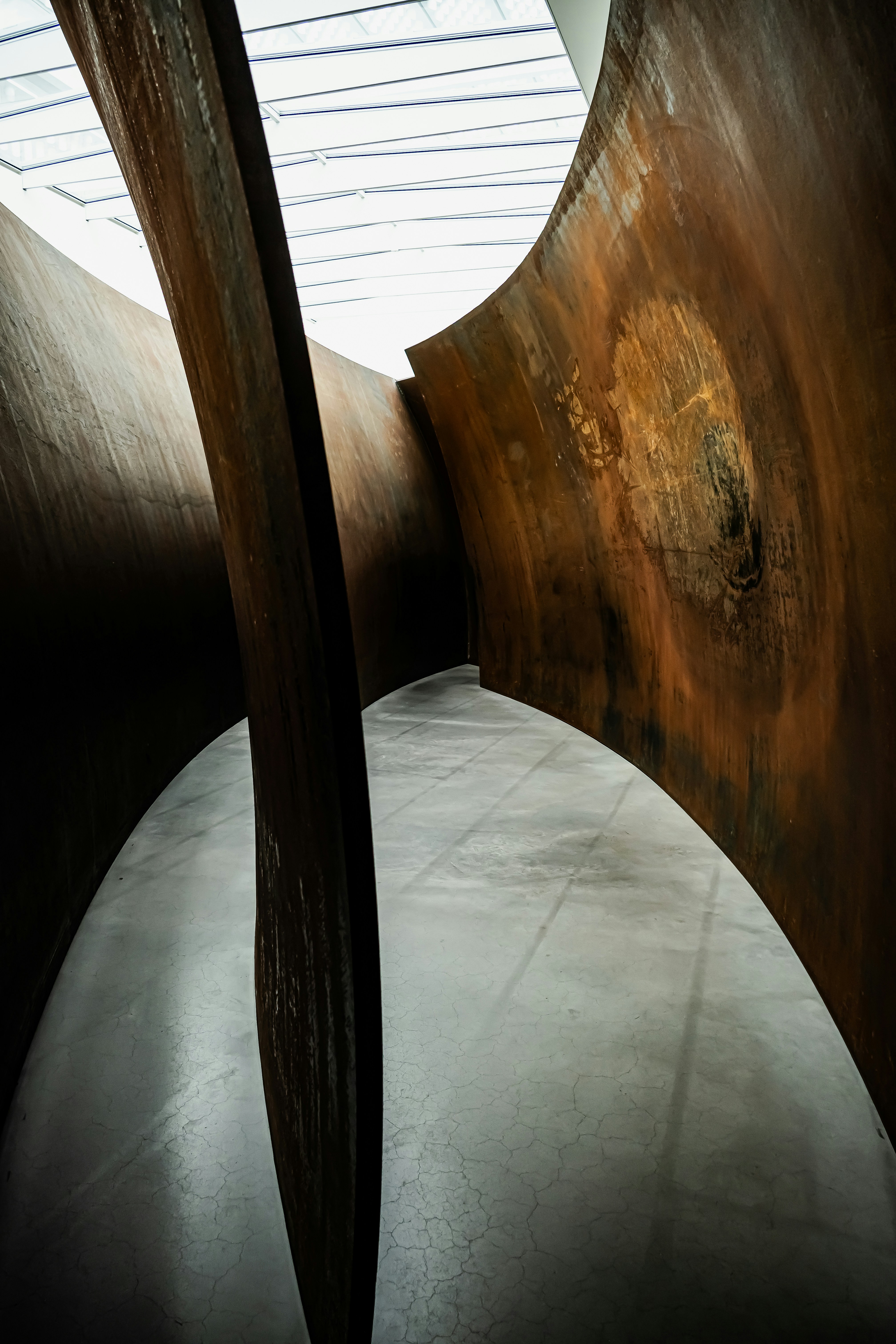 Curved Rust and Concrete: A Spiral Walk Through Abstract Architecture