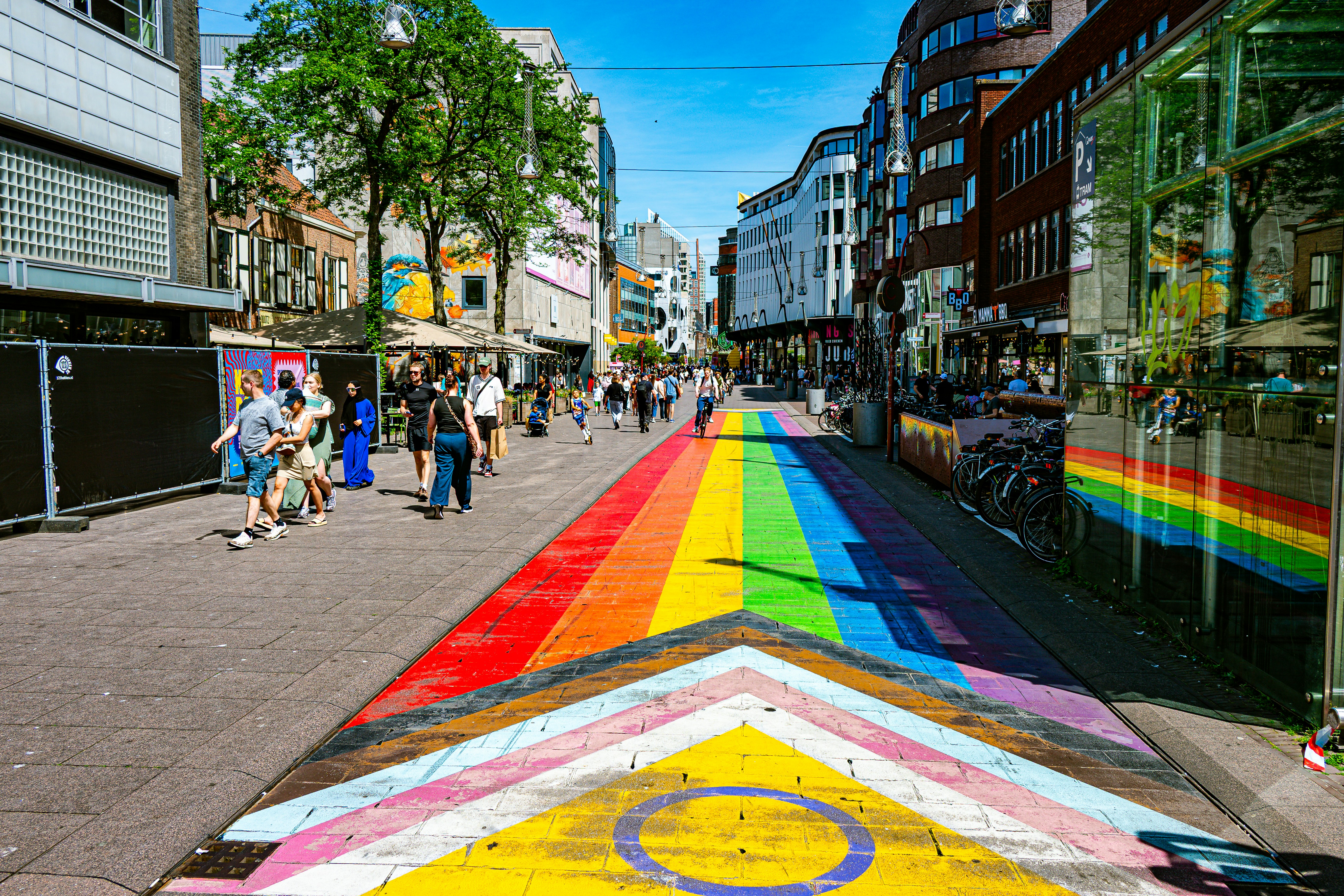 Rainbow Avenue: A Pedestrian Street Painted with Pride Reaching Toward the City
