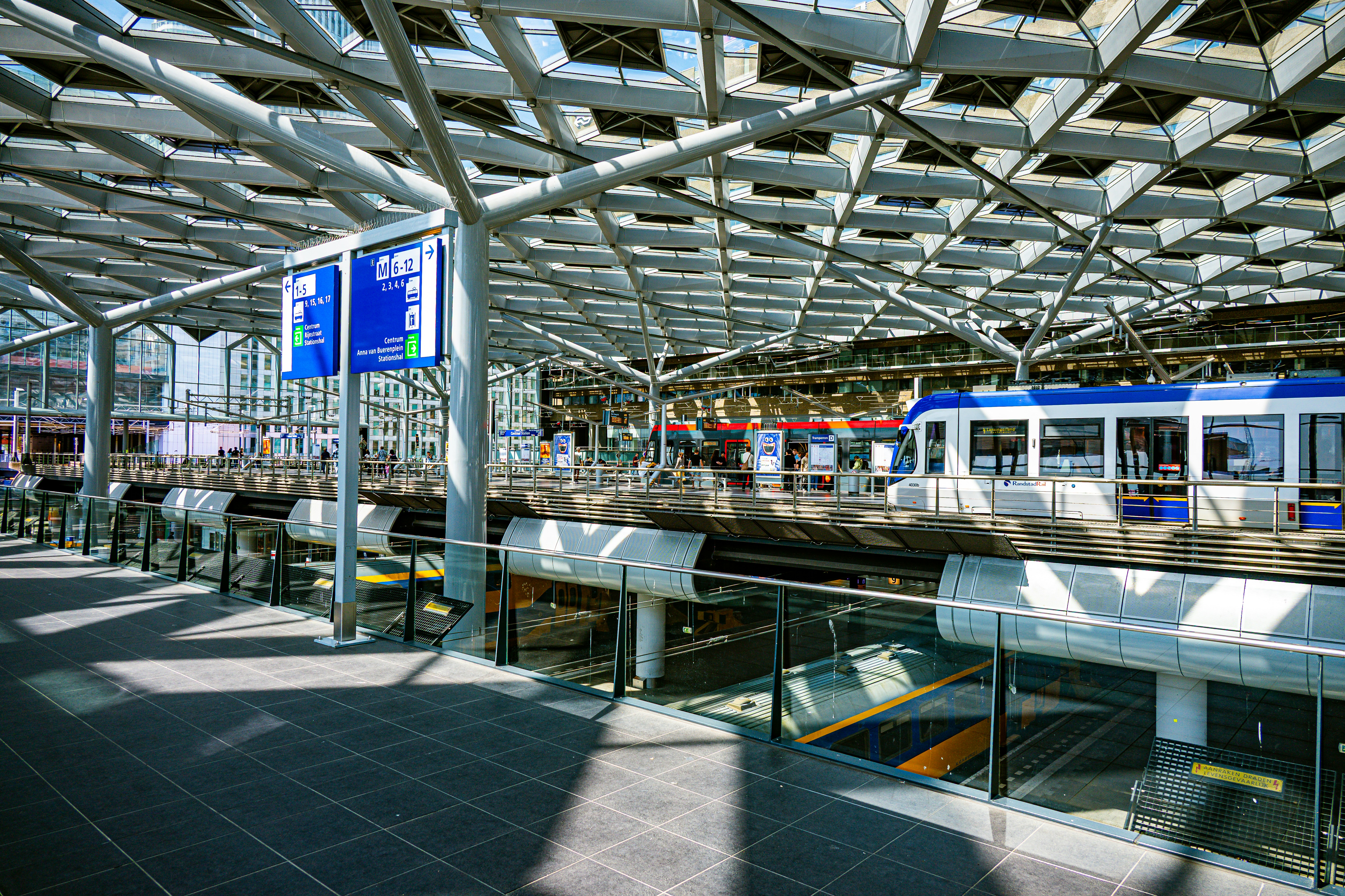 Architectural Canopy Over the Platform: A Light-filled Station Scene