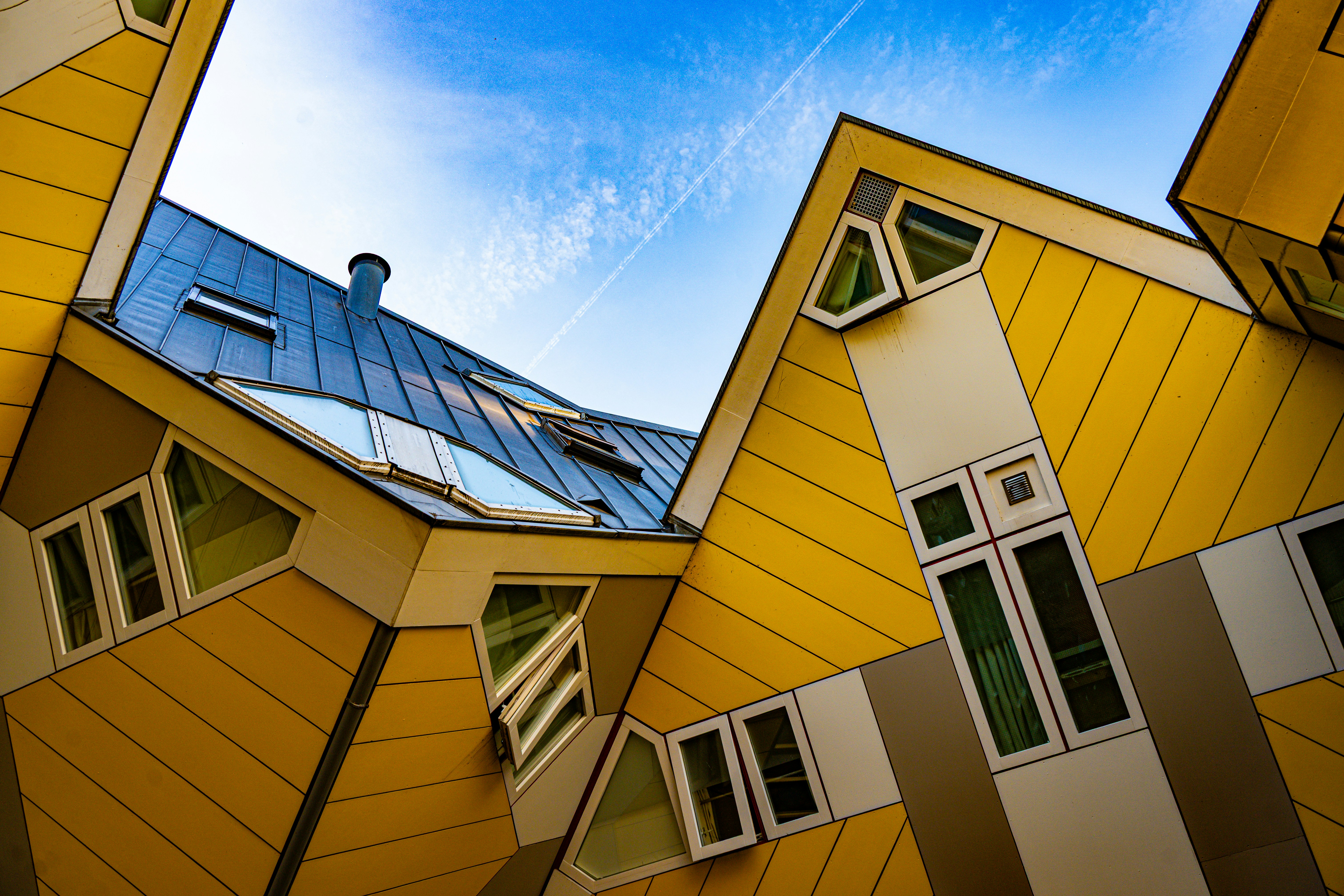 Angular Sunlit Facades: A Kaleidoscope of Yellow and Geometry