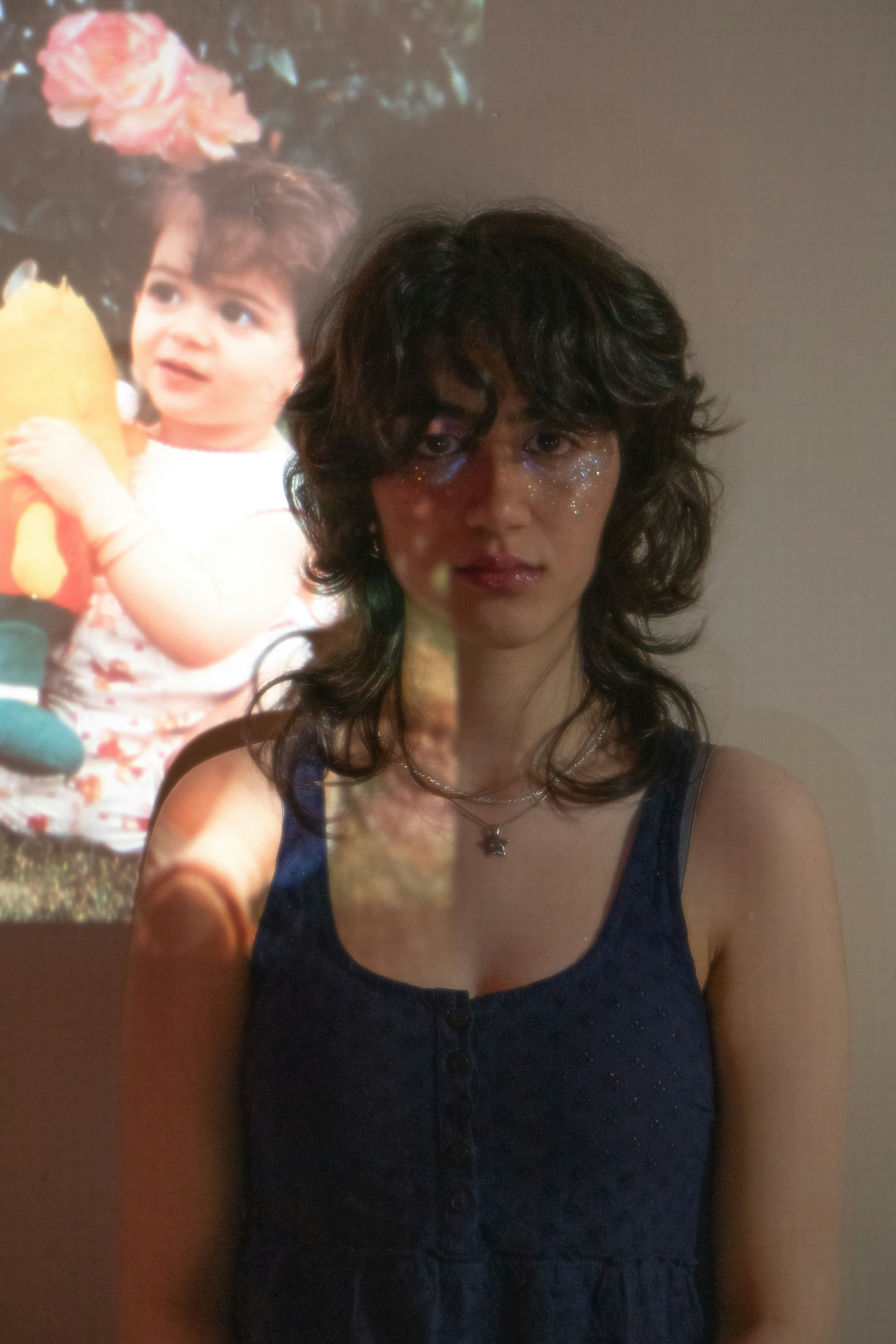 Portrait in Projection: A Woman Beneath a Hazy, Multi-Layered Display