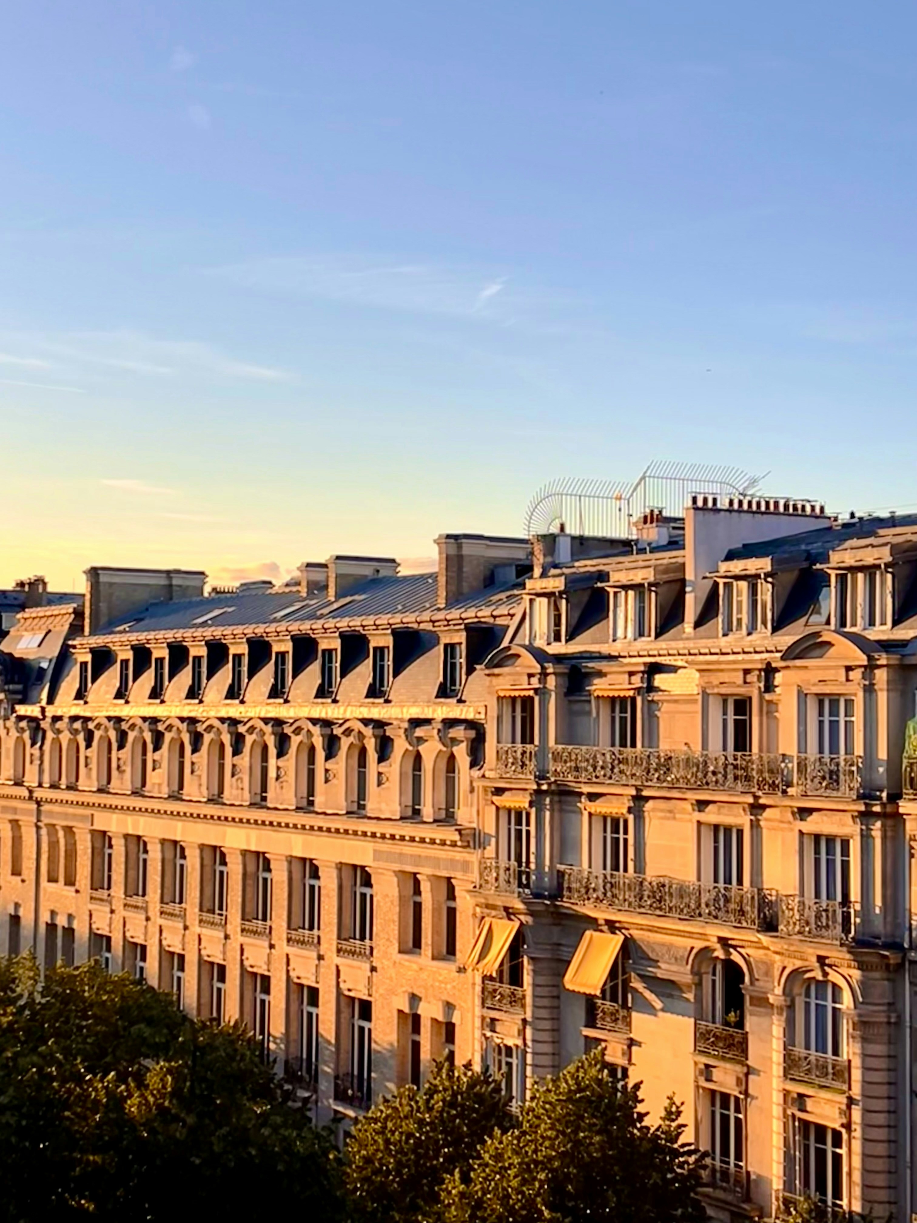 Sunlit Façade Parade: Parisian Rooftops at Golden Hour