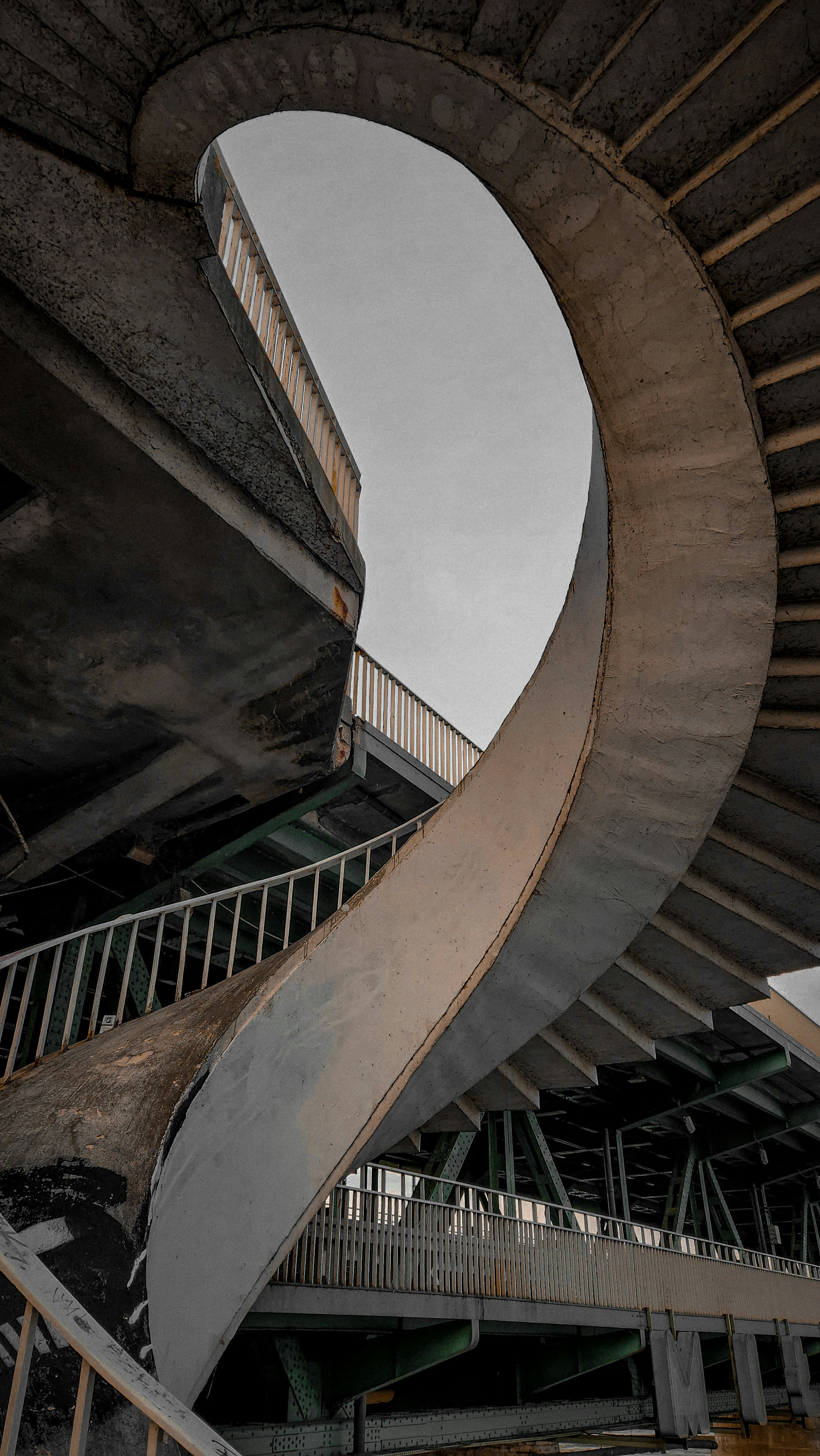 Coiled Concrete: An Industrial Spiral Framed by Light and Shadow