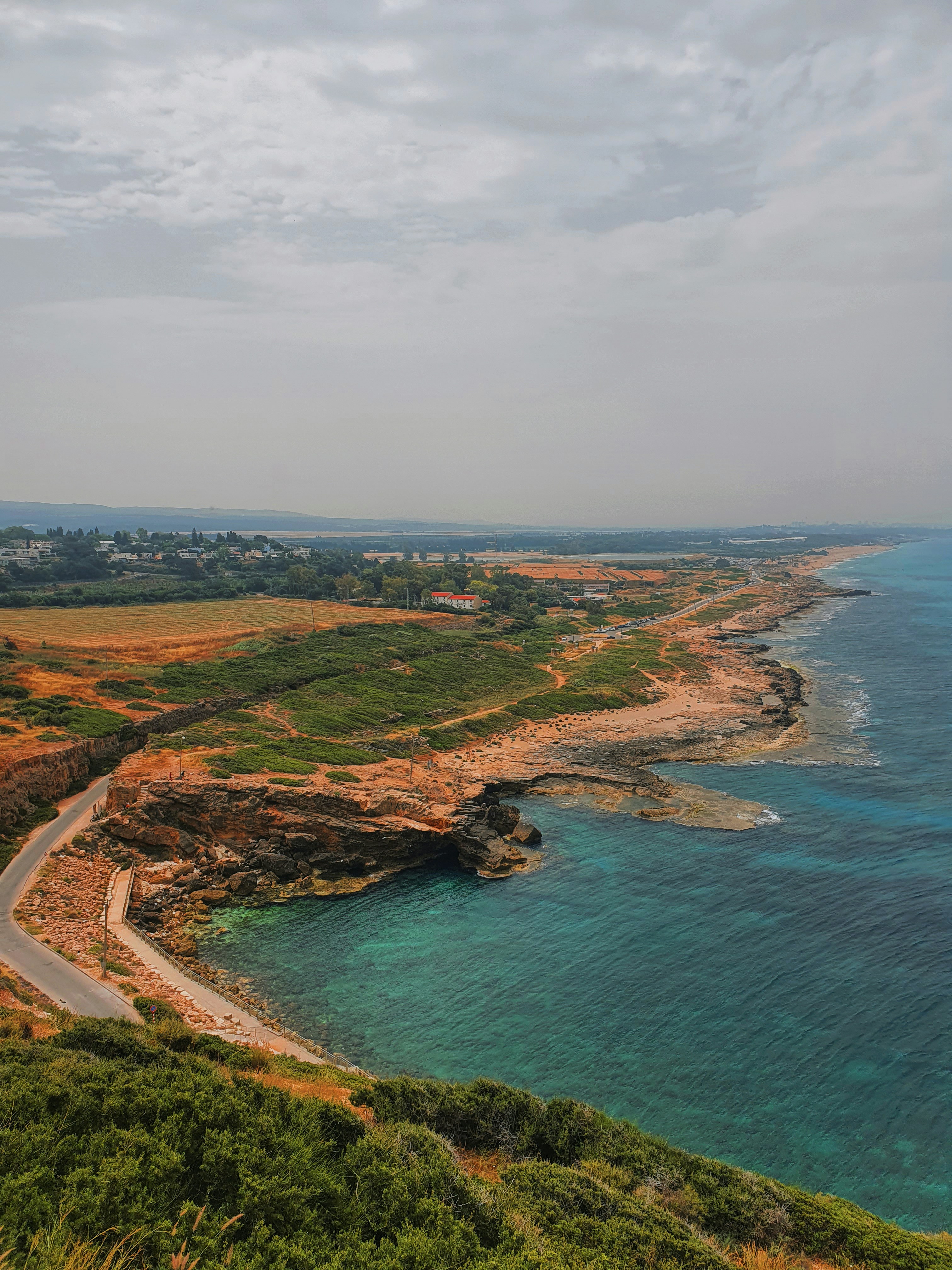 Coastal Cliffs and Turquoise Seas: A Roadside Panorama
