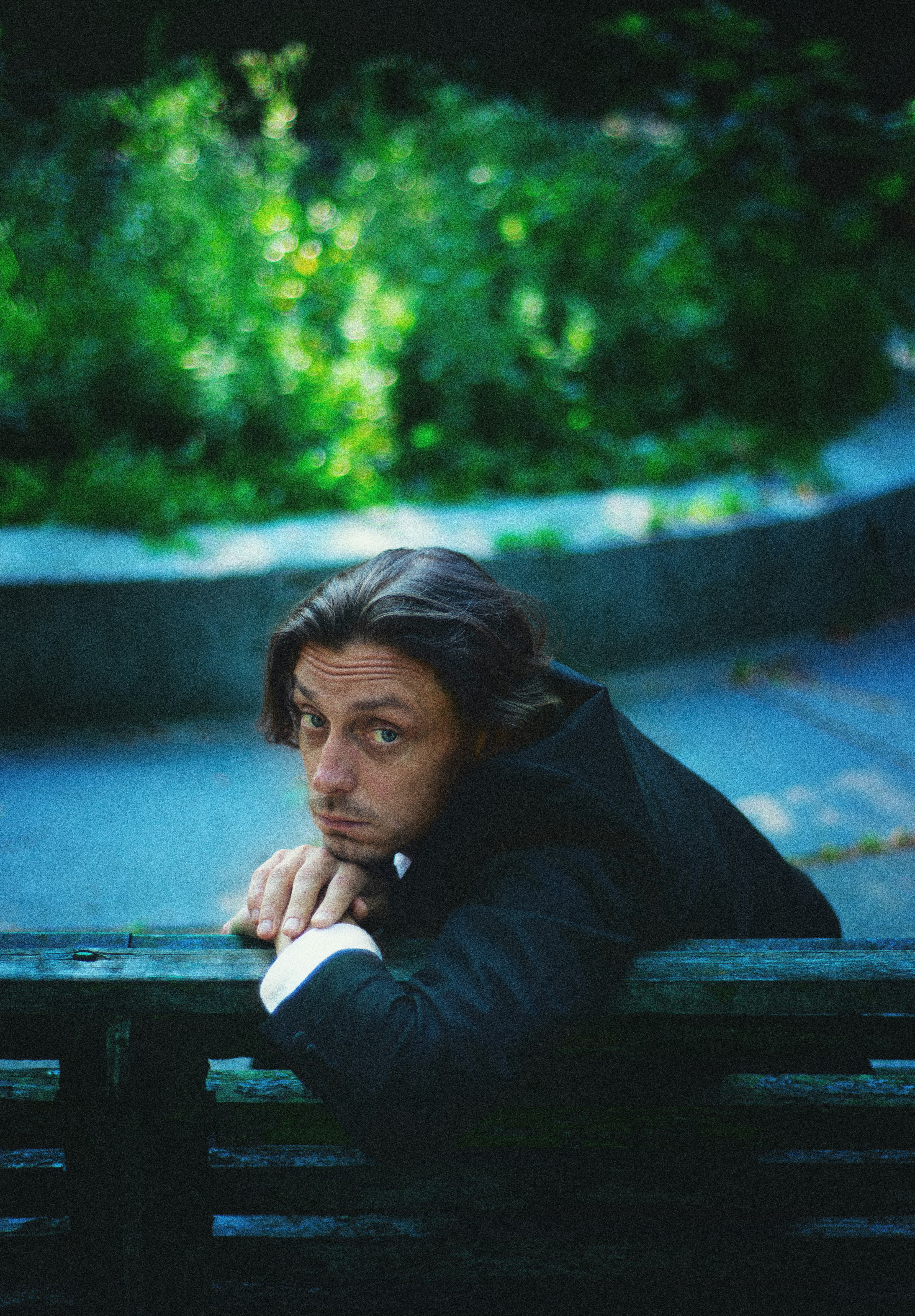 Low-angle Portrait on a Quiet Bench
