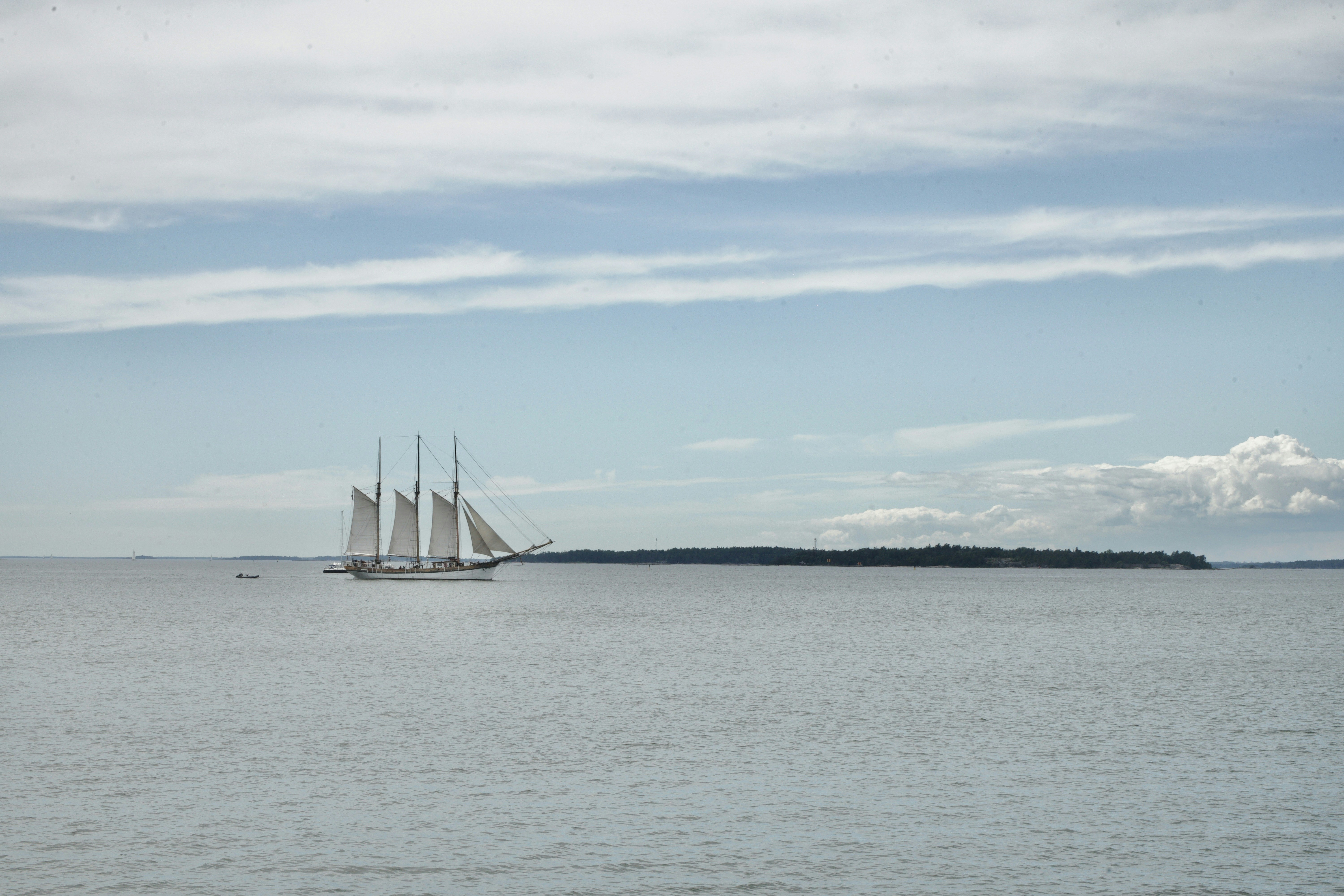 Sailing Silhouette on a Quiet Horizon