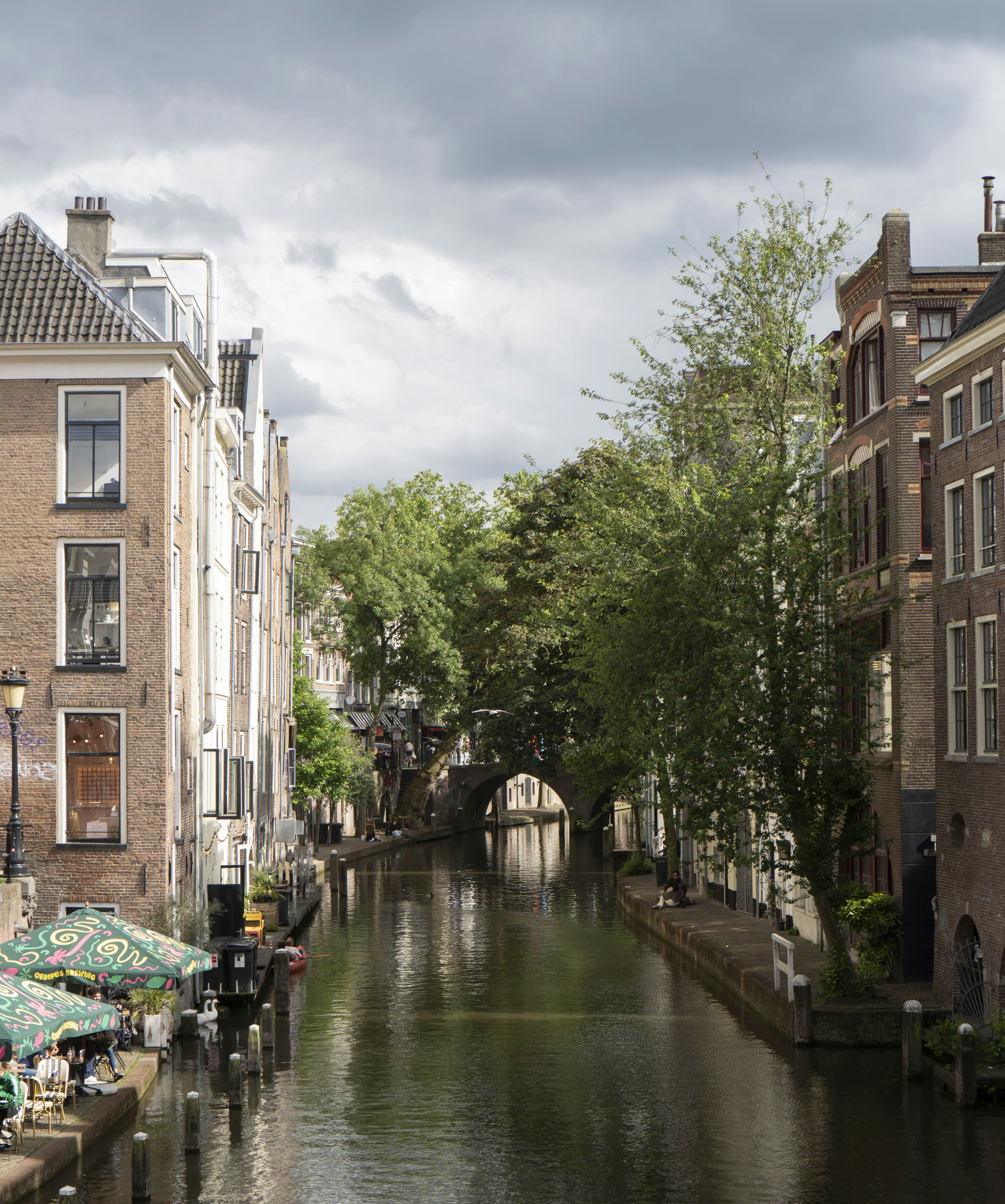 Canal in Bloom: Archway, Boats and Historic Brick