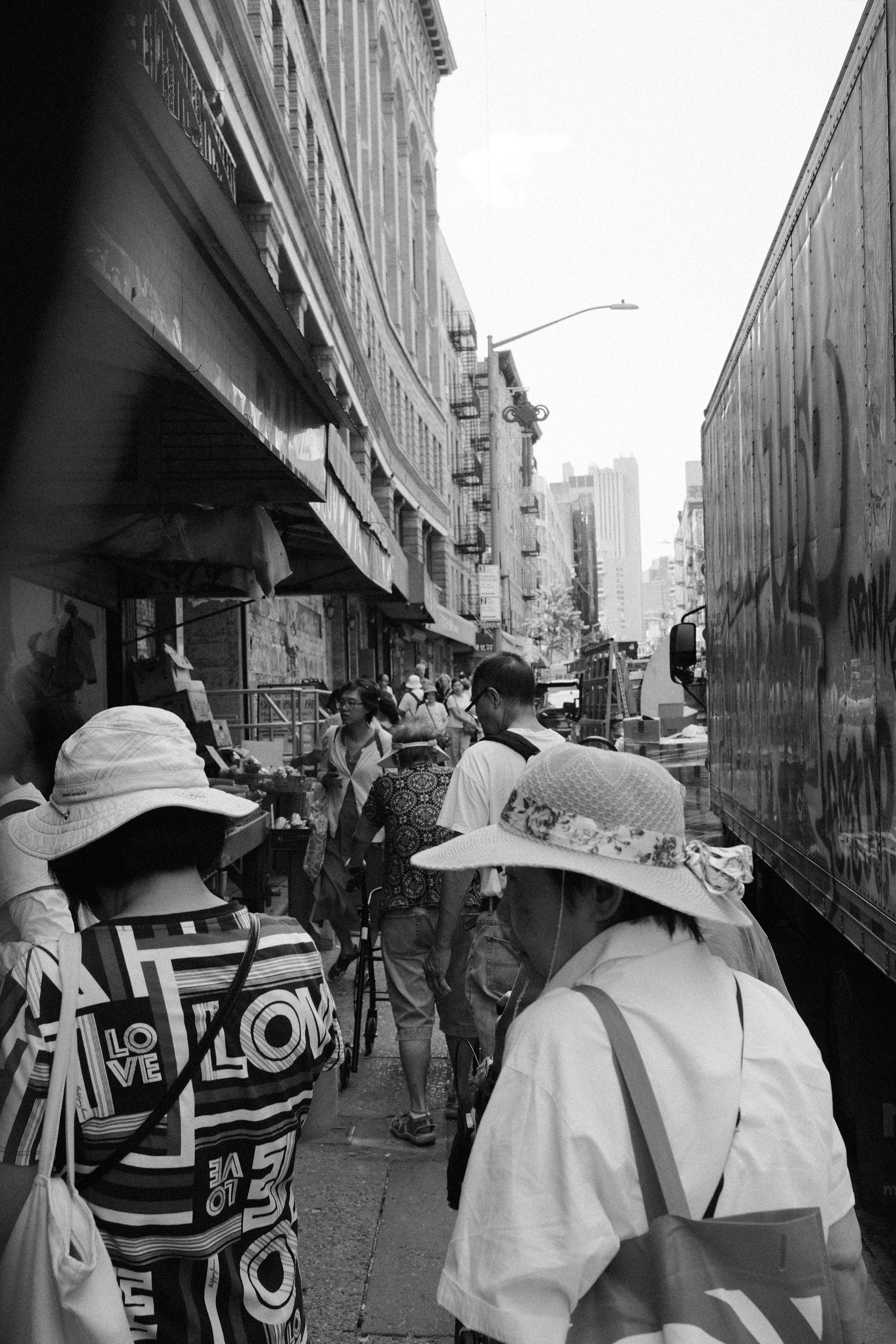 Crowded Street Portrait in a Black-and-White Market Scene