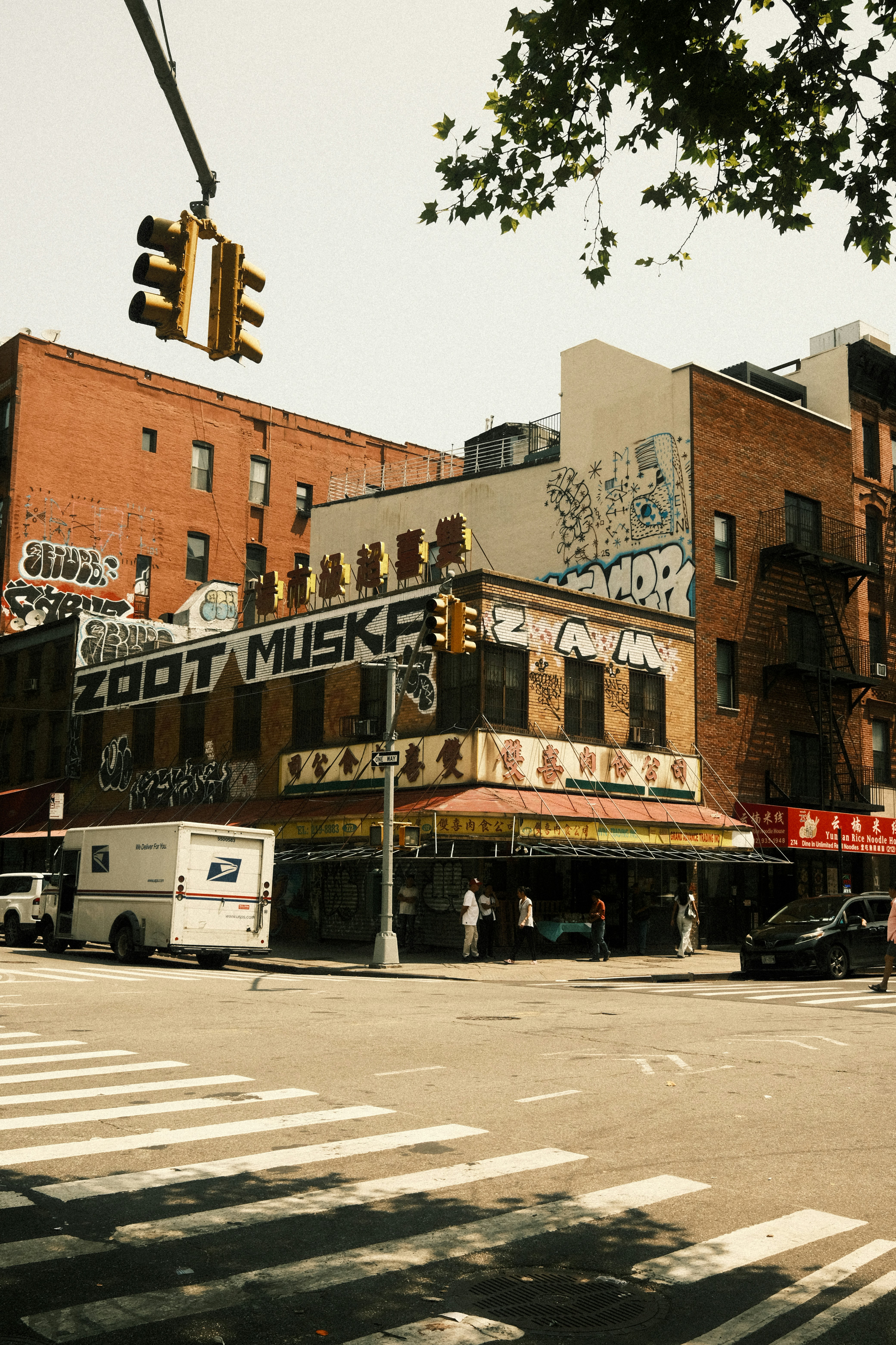 Graffiti Theater: The Corner Mart with Neon Signs