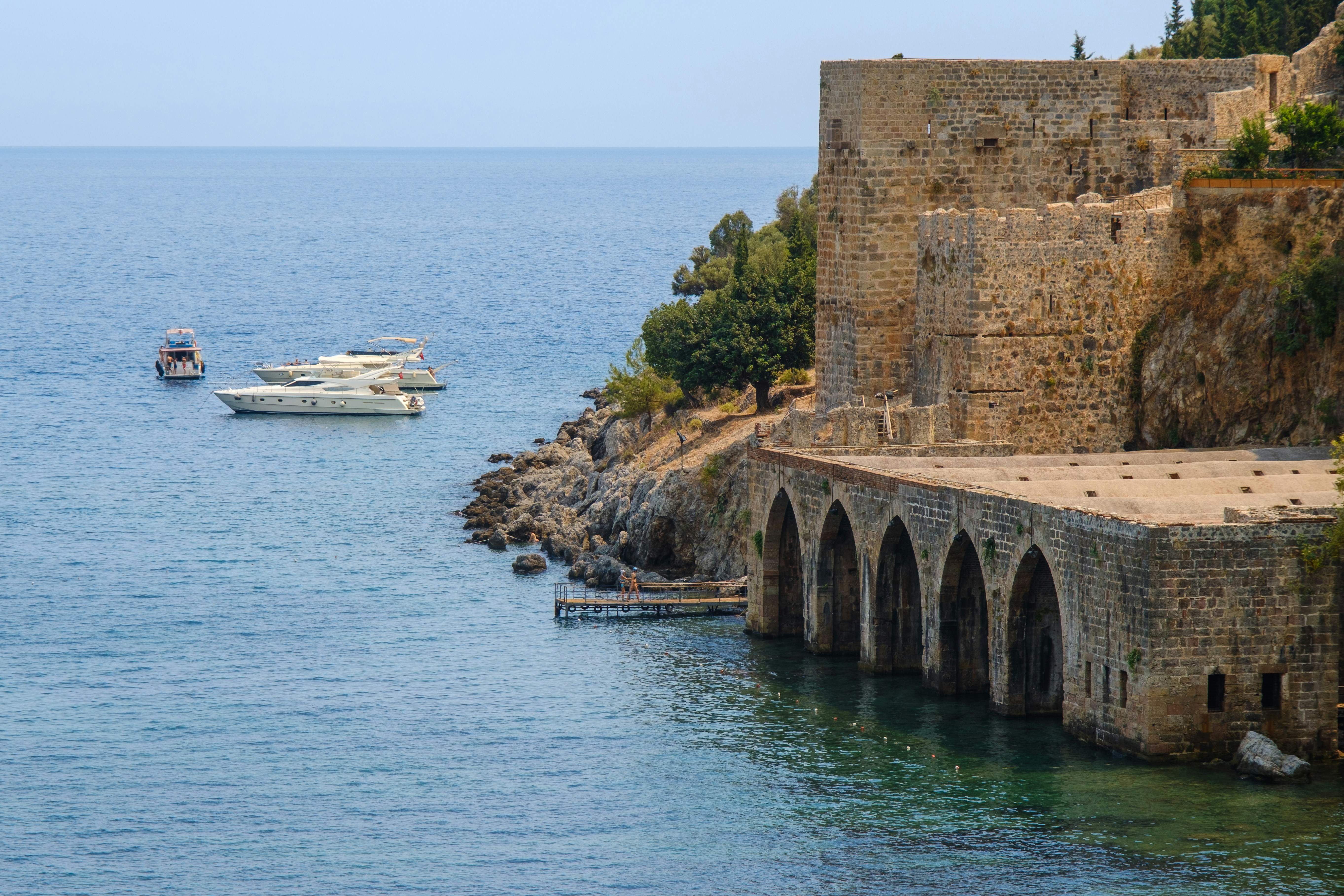 Fortress by the Quiet Sea: Arched Harbor and Timeless Stone