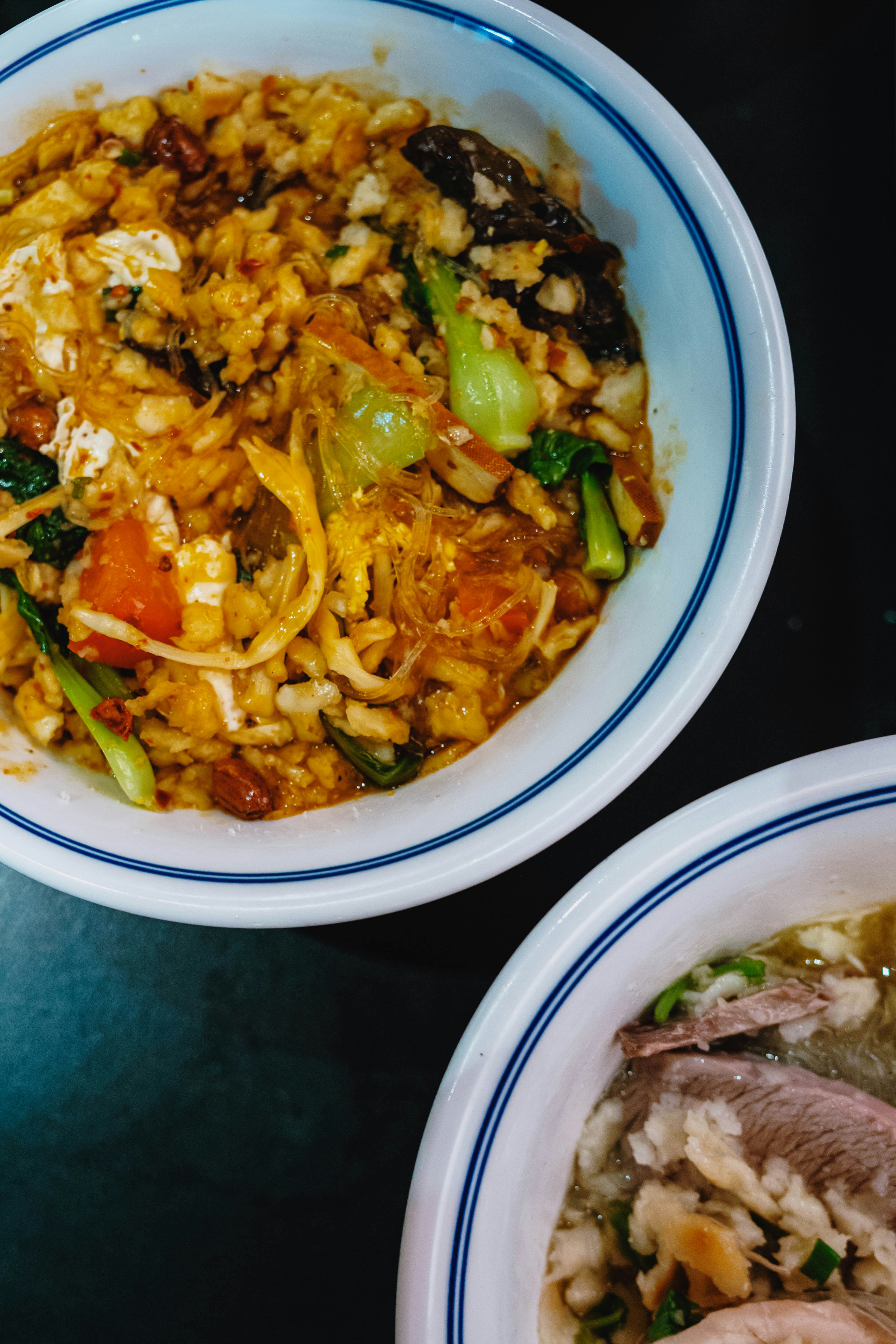 Two Bowls, One Table: A Colorful Verse of Stir-Fry and Braised Meat