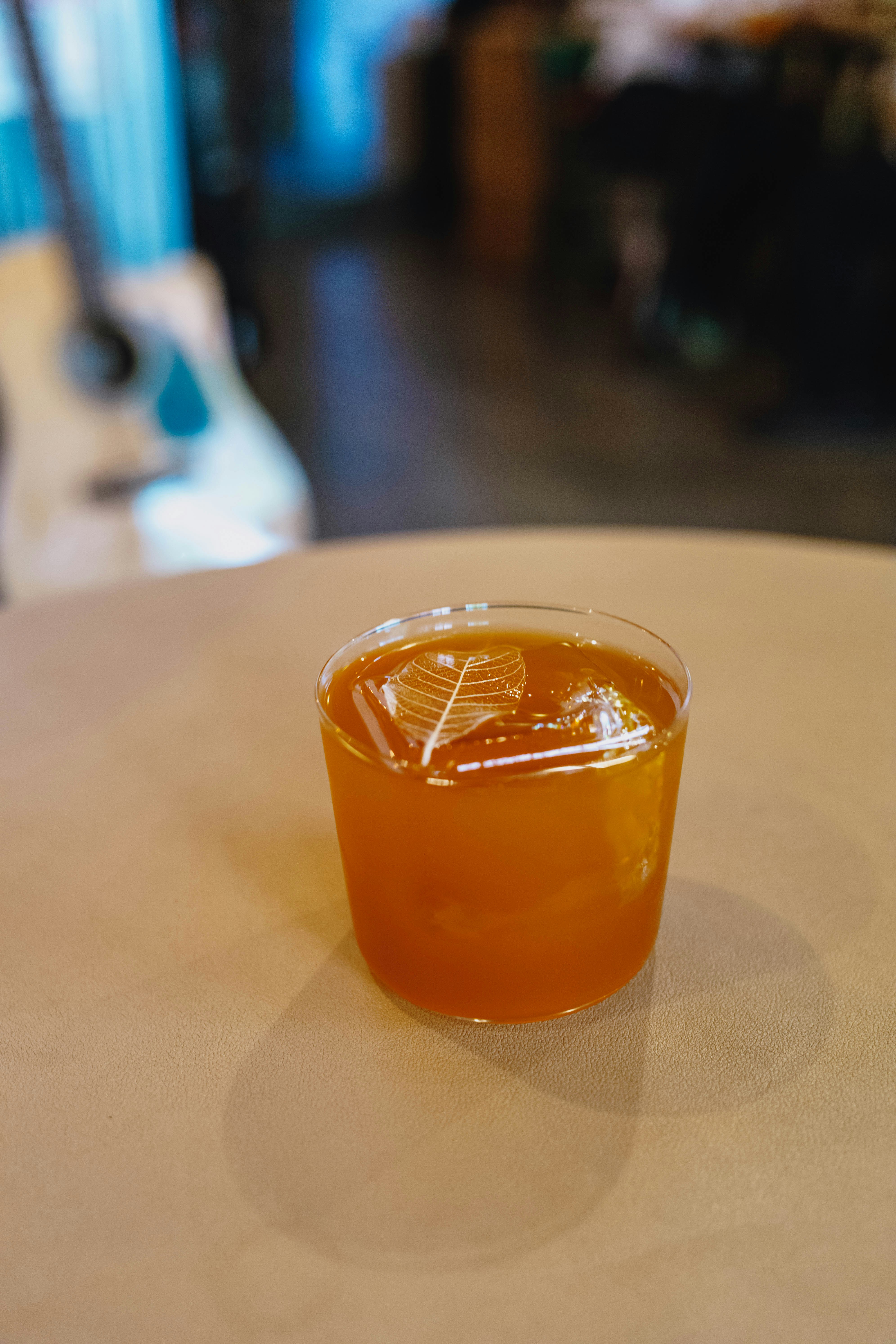 Amber Oasis: A Glass of Tea on a Quiet Table