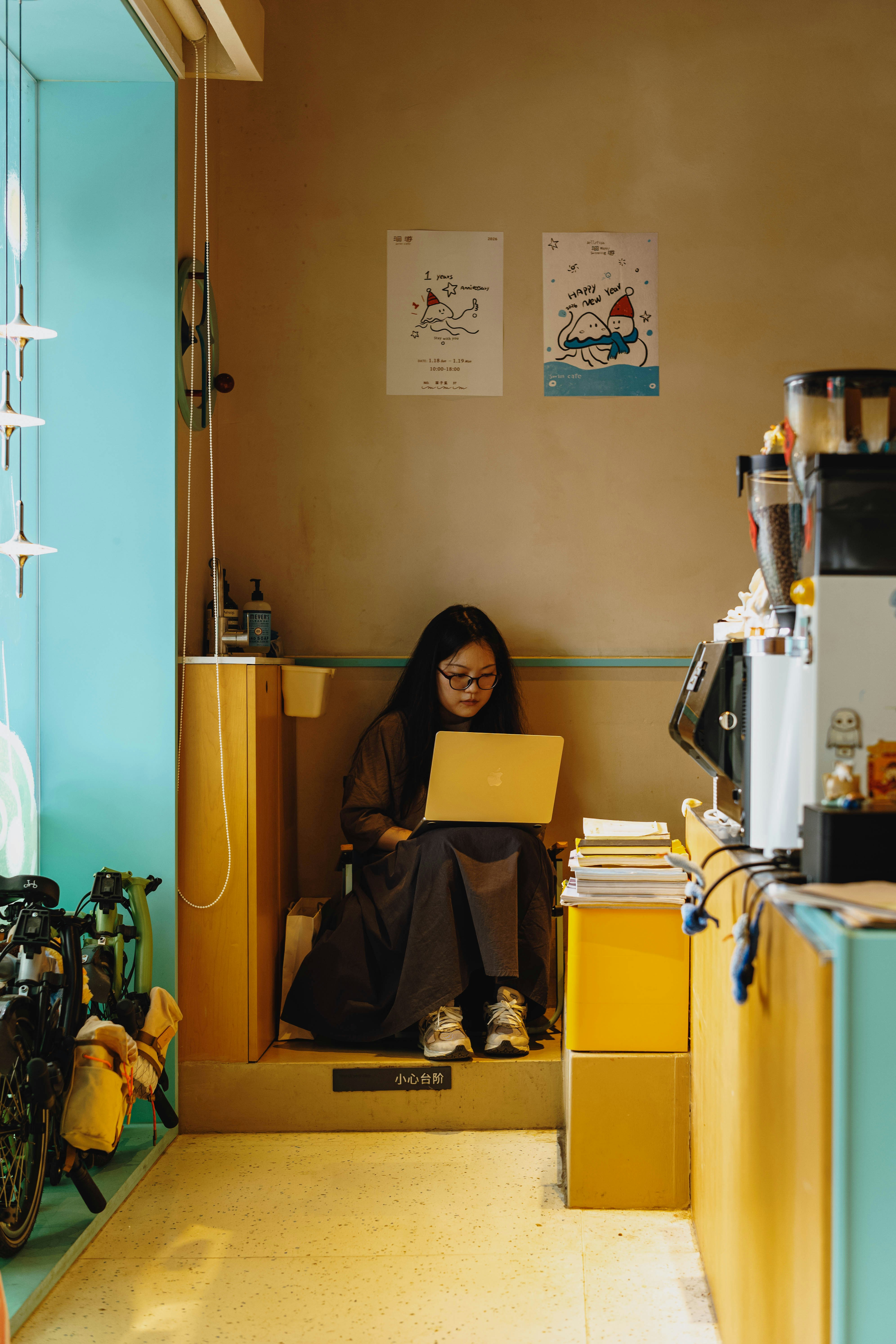 Luminous Focus: A Student at Her Quiet Keyboard Corner