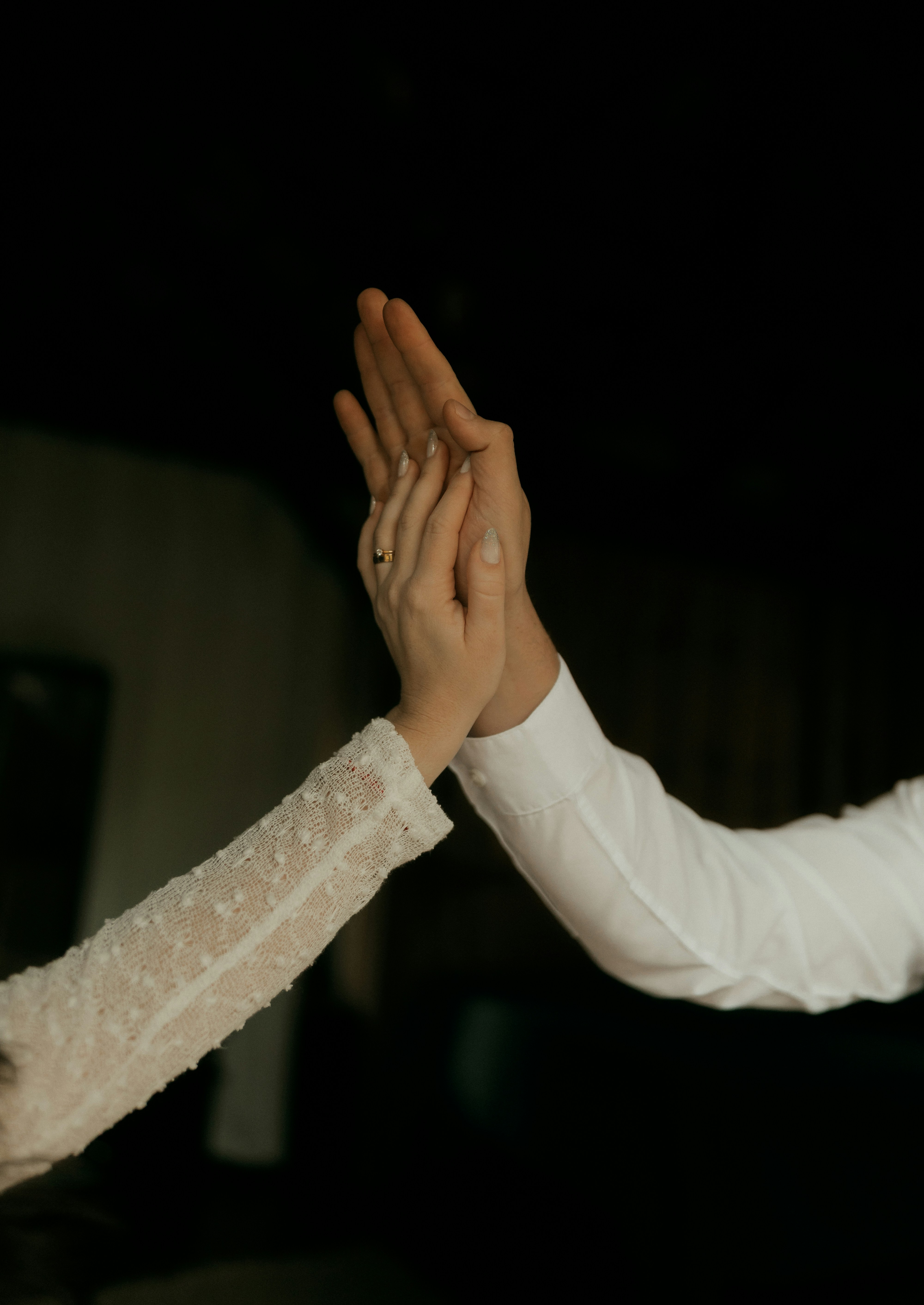 Interwoven Hands: A Quiet Union in Soft Light