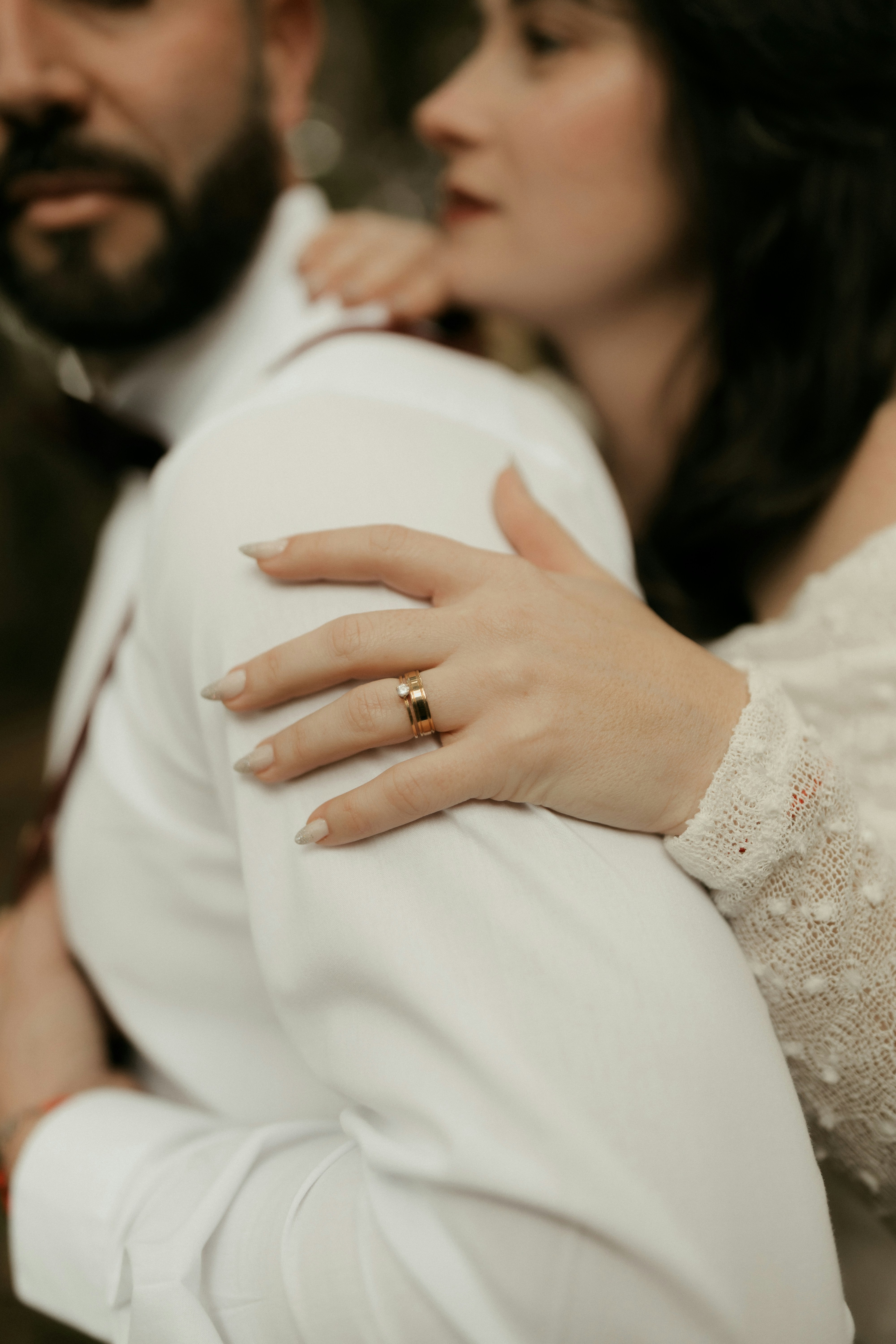 Gentle Embrace: A Wedding Moment Painted in Soft Light