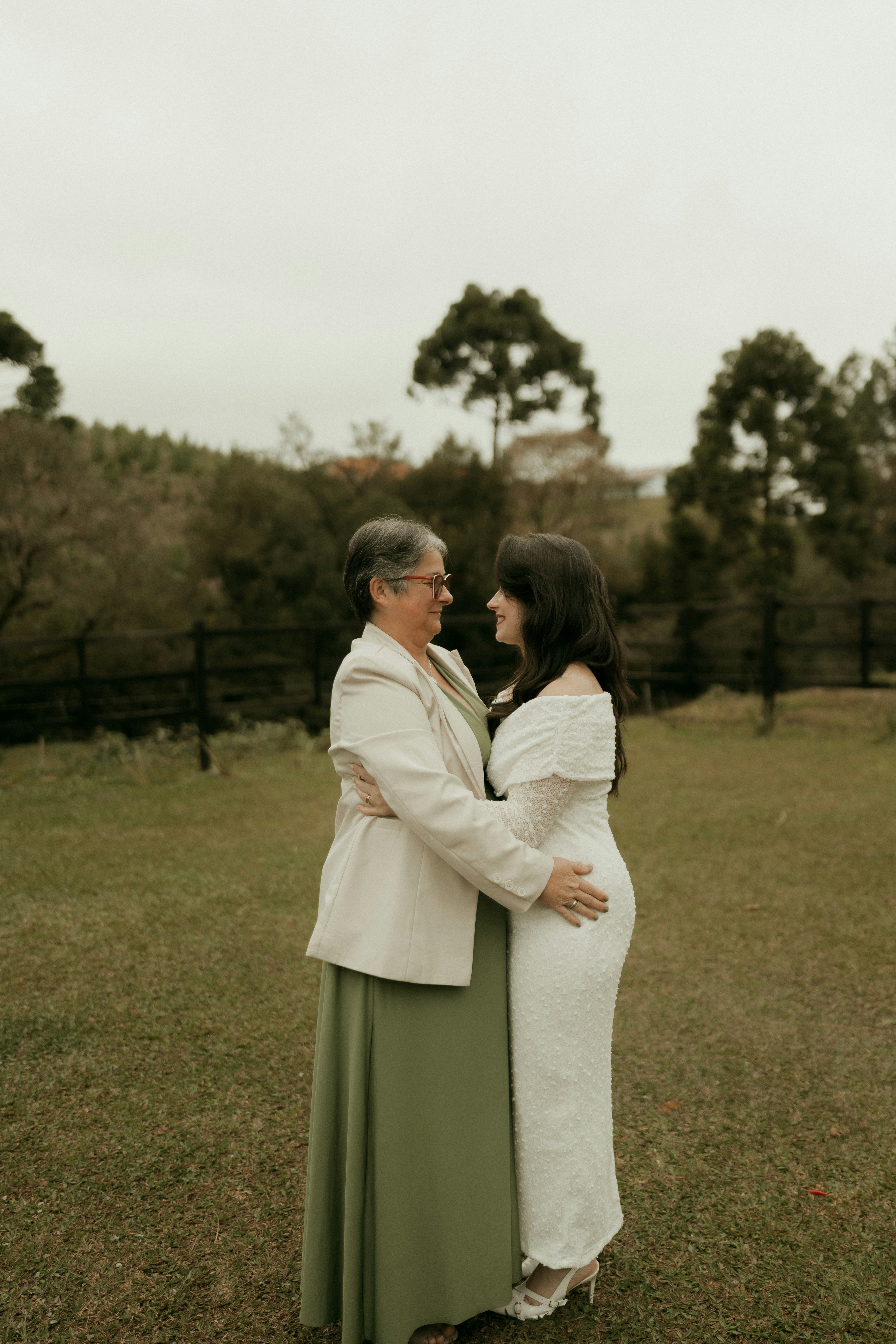 Embrace in the Orchard: A Tender Moment Between Generations