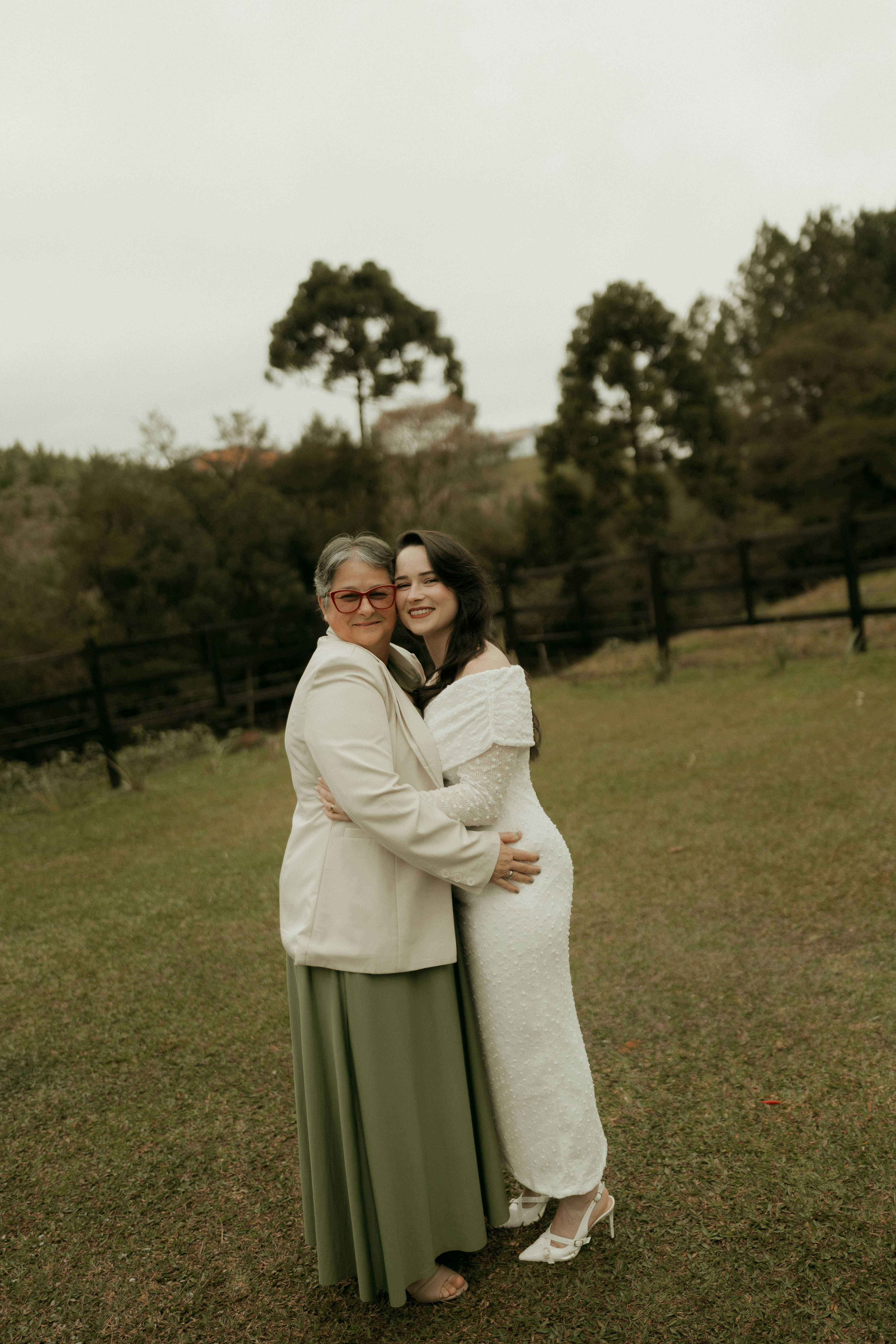 Embrace in the Orchard: A Quiet Portrait of Two Generations