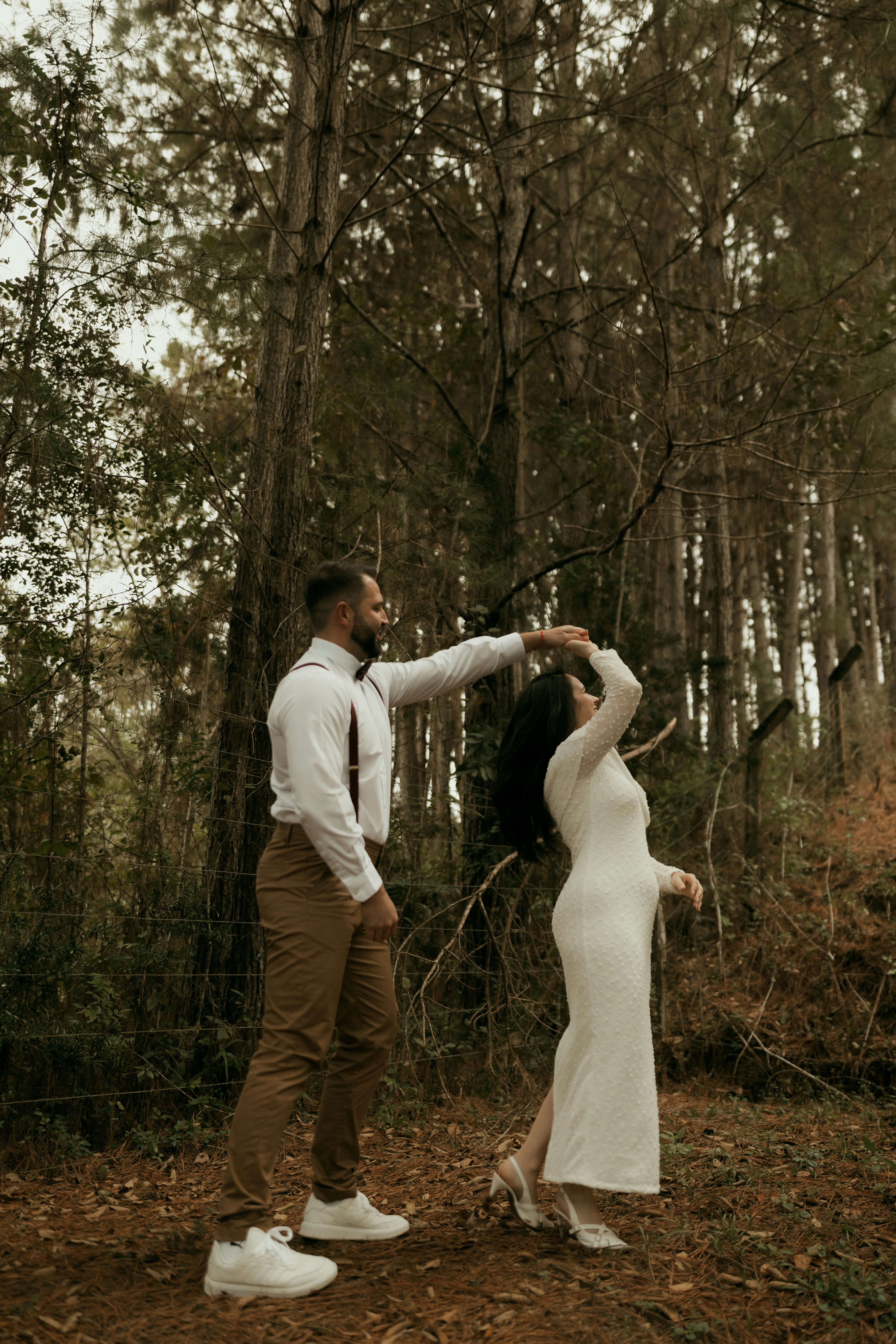 Dancing in the Quiet Pines: A Couple's Gentle Spin