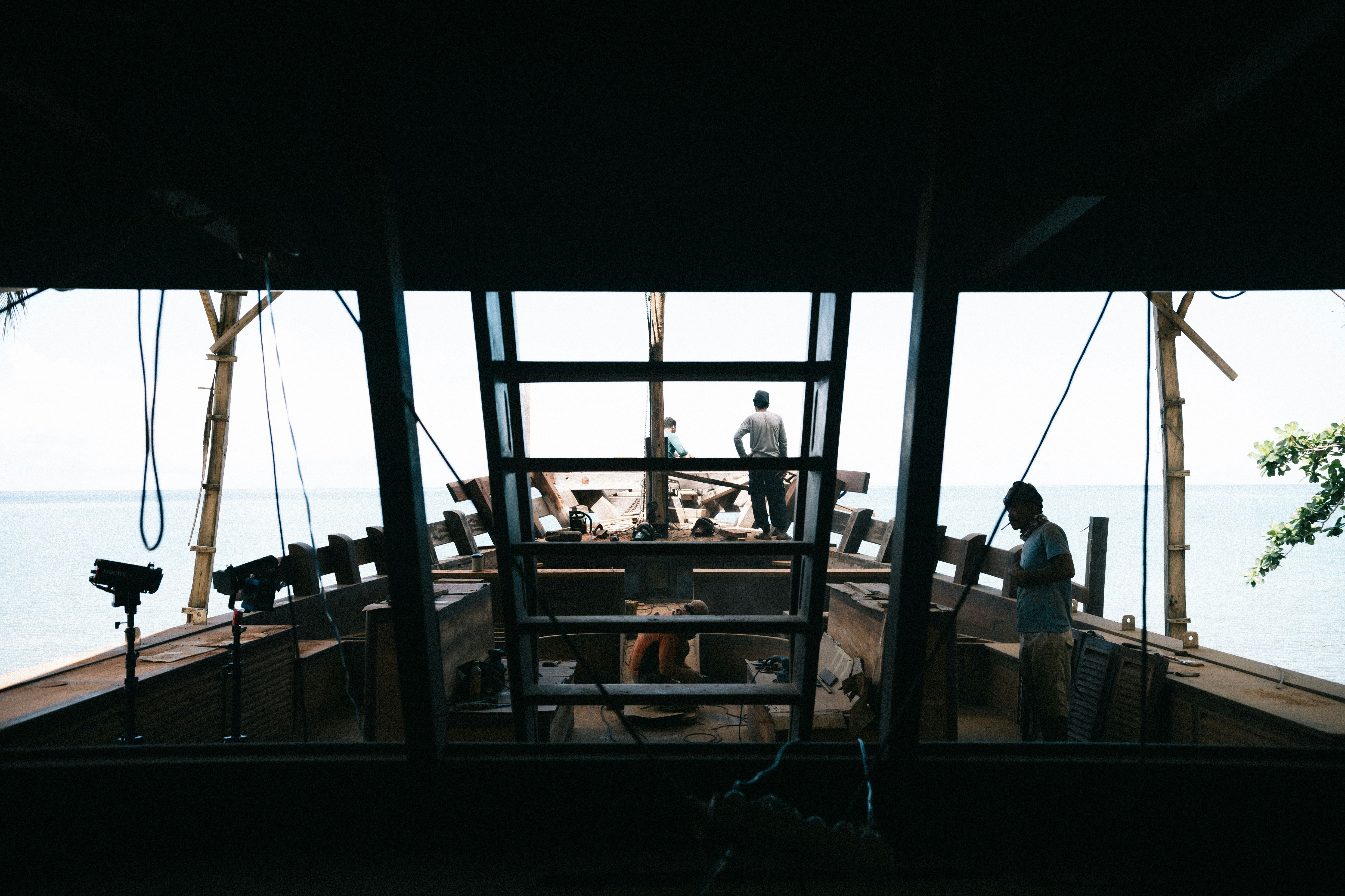 Crew On Deck: Framing the Build and Horizon Through a Ship’s Entrance